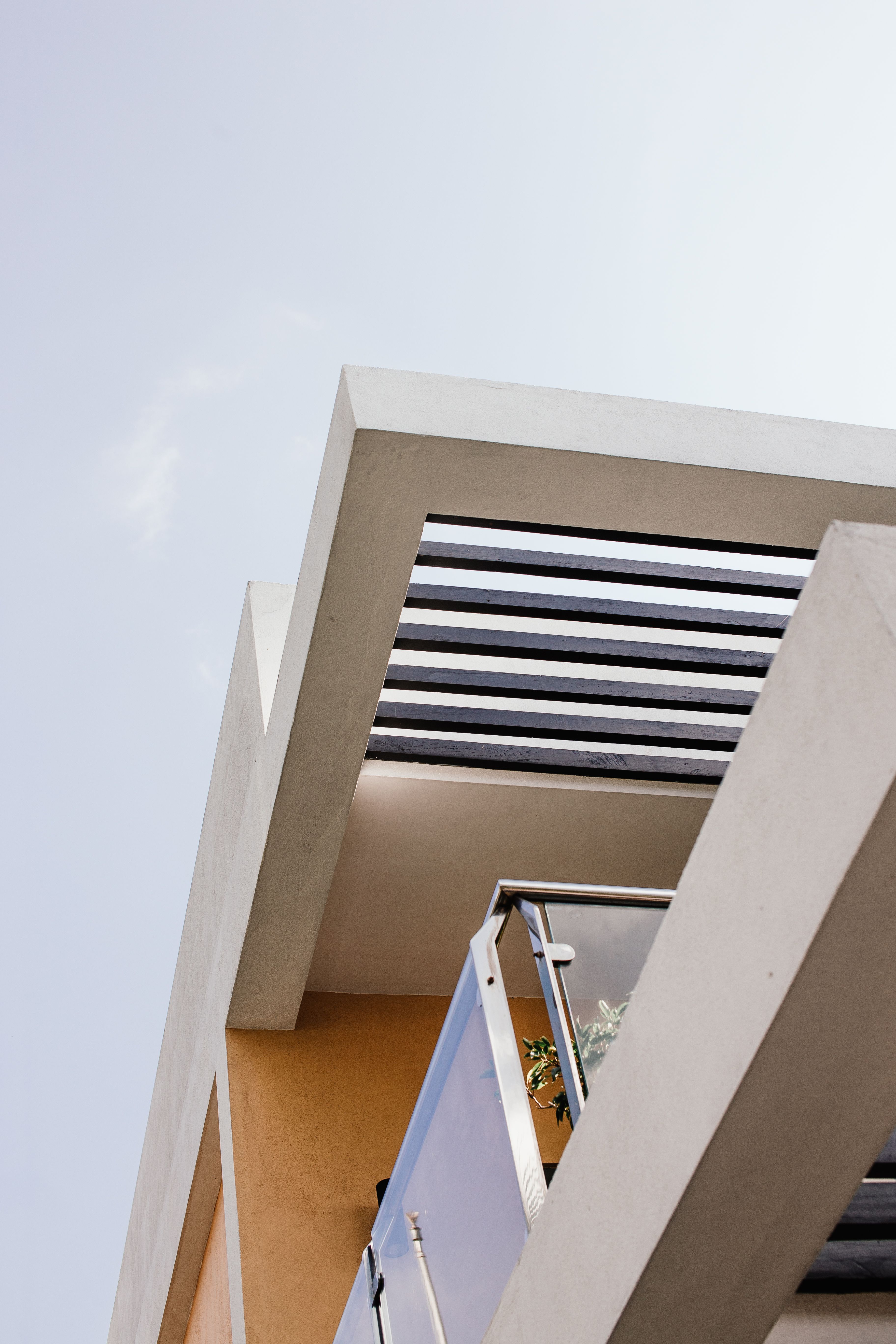White Concrete Building With Trellis · Free Stock Photo