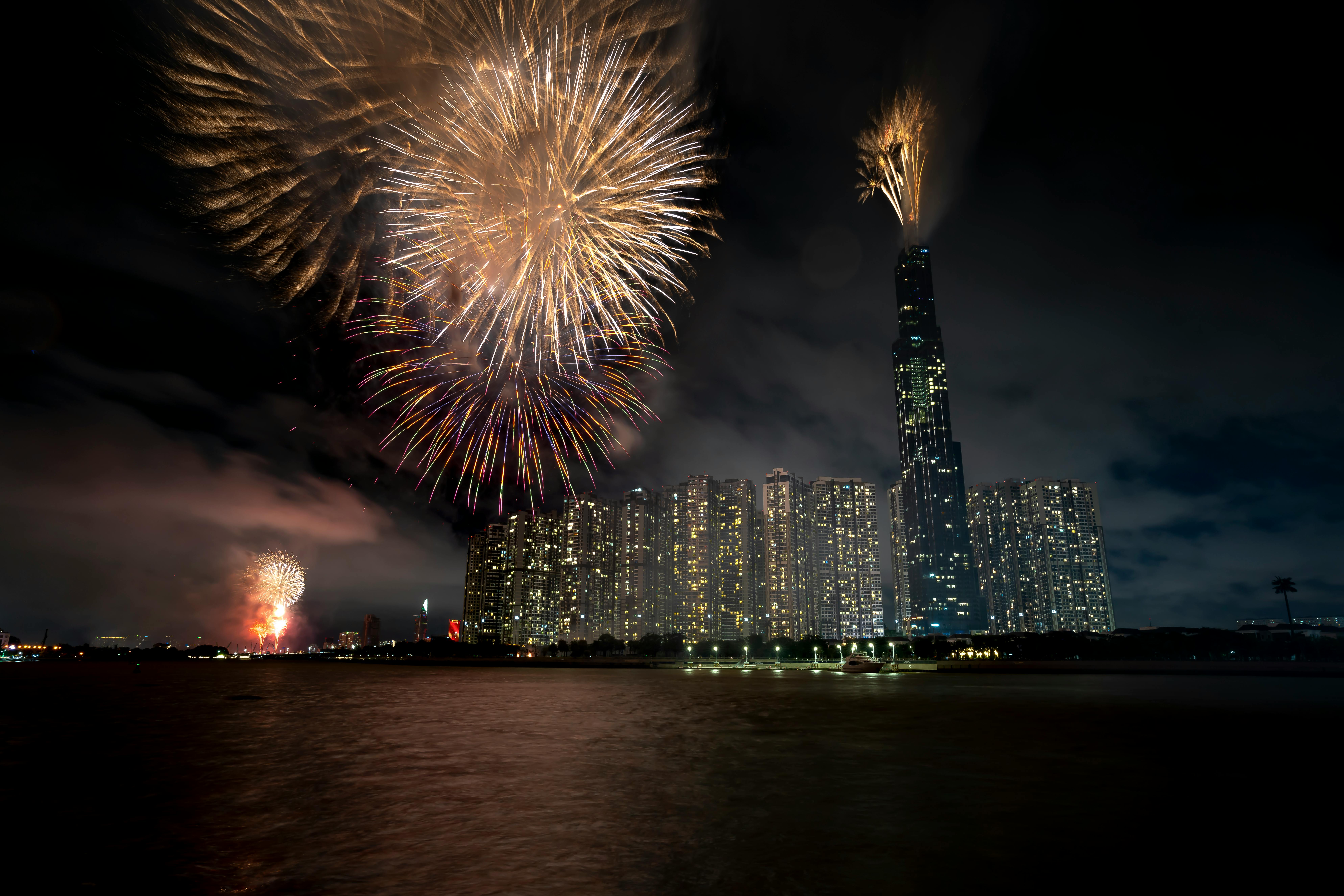 Fireworks Display over Building · Free Stock Photo