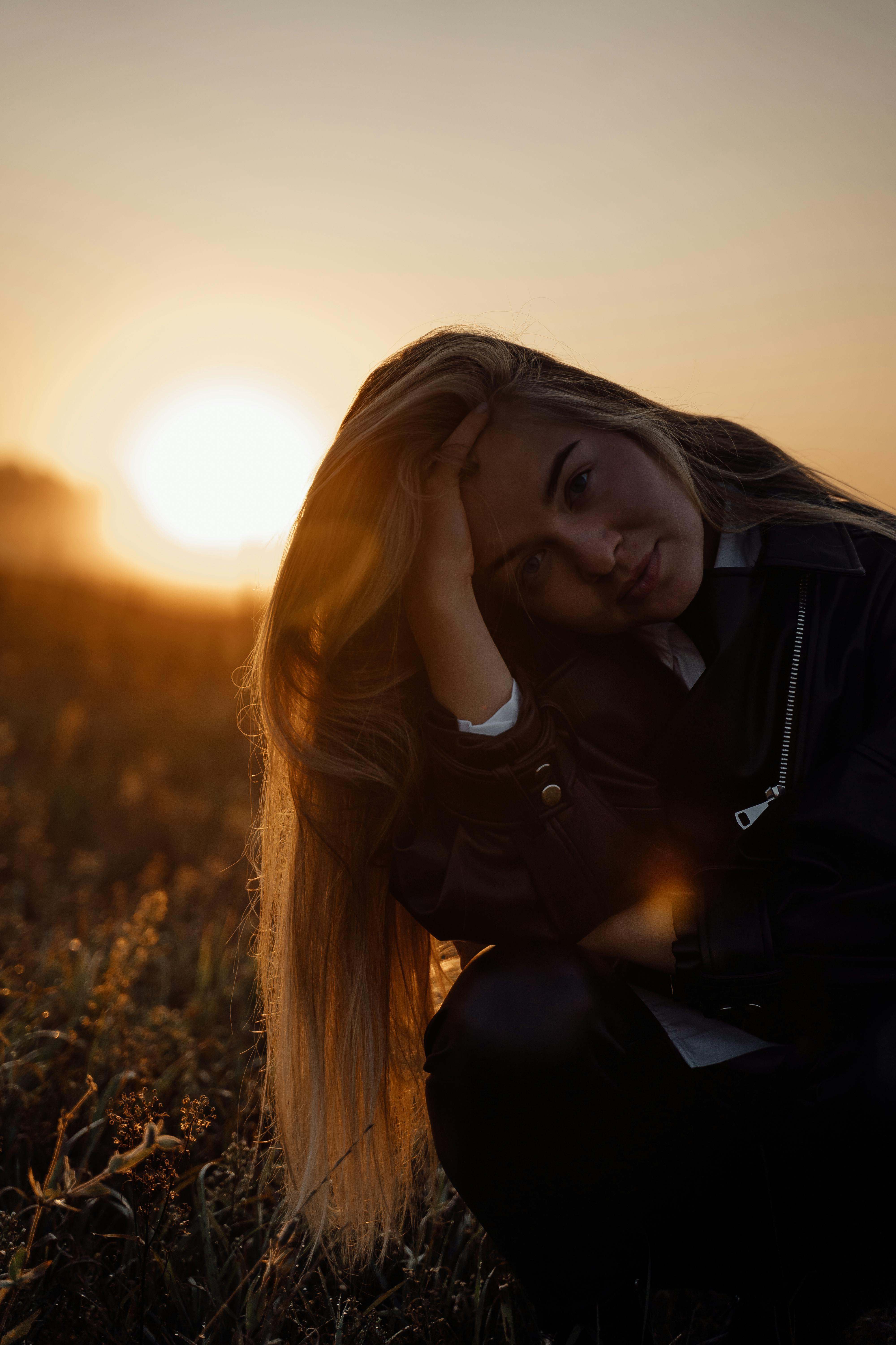 Back View of a Woman Wearing a Leather Jacket · Free Stock Photo