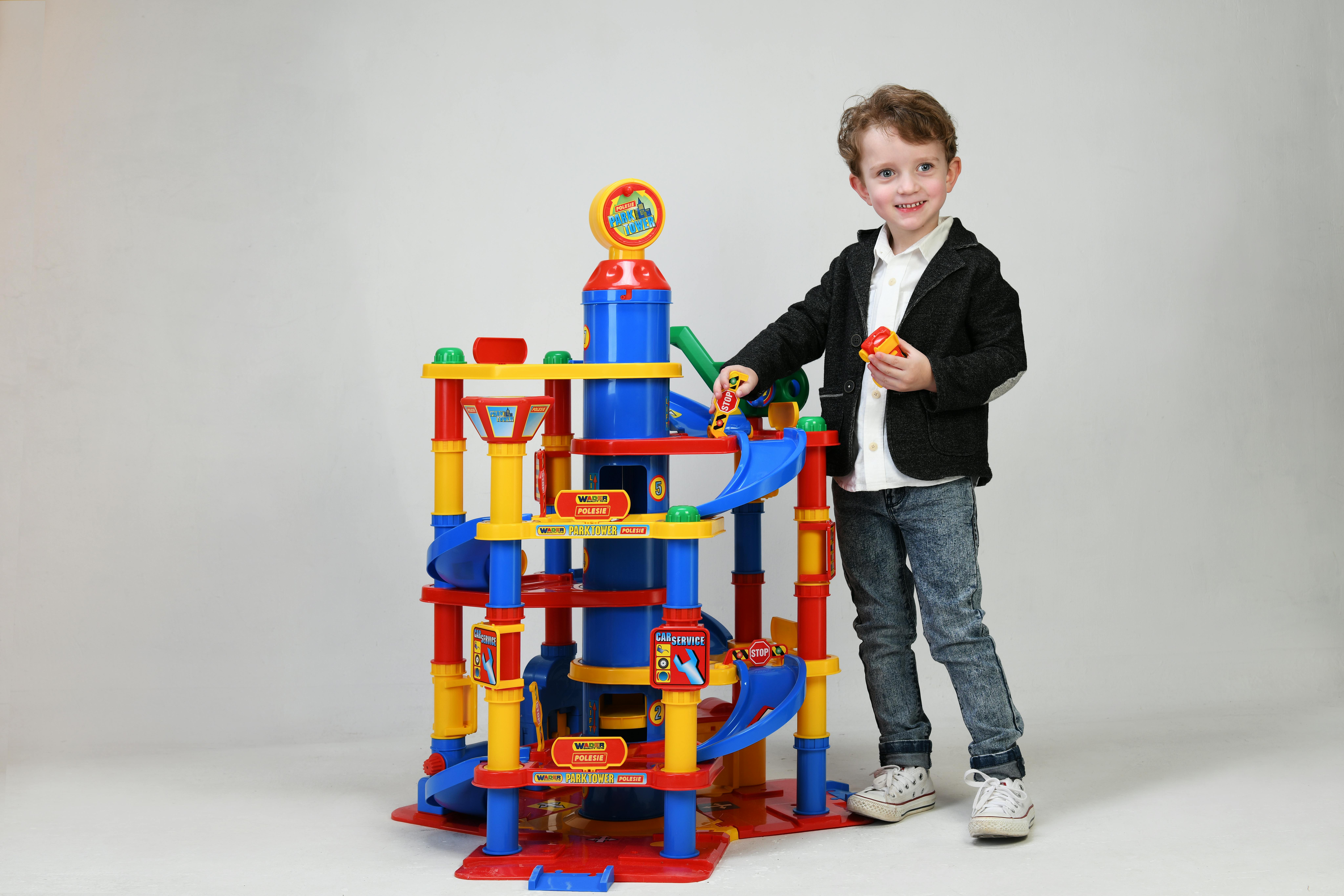 Young Boy playing Park Tower Toy · Free Stock Photo