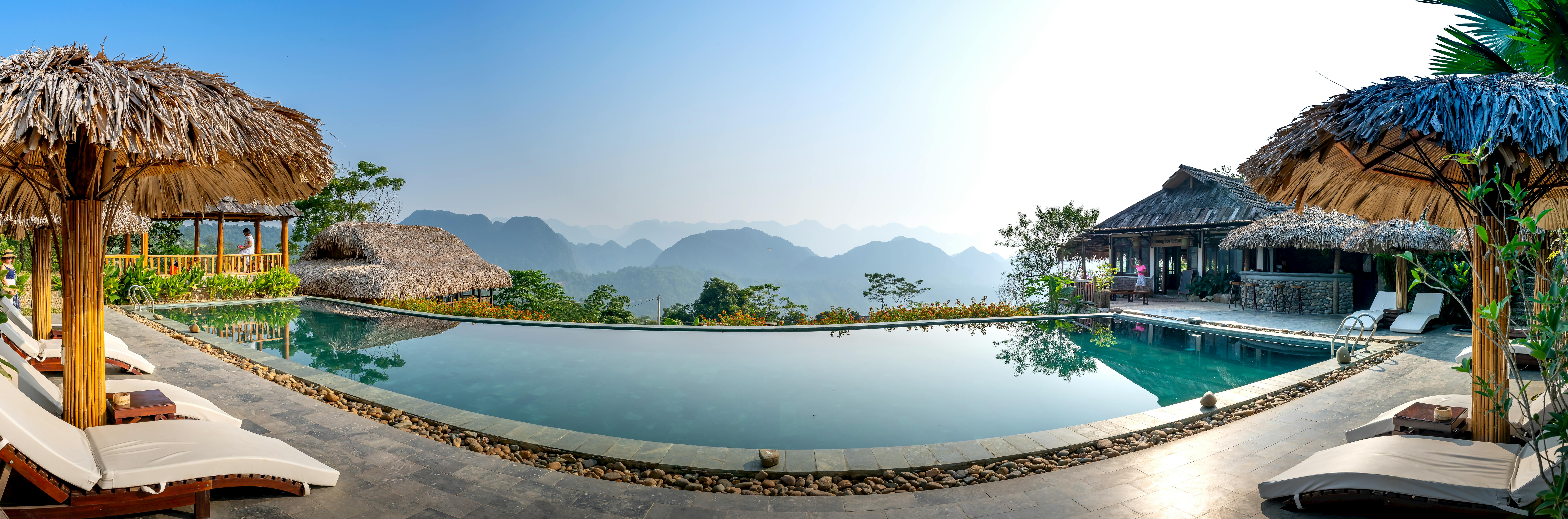 Cheerful woman chilling in swimming pool · Free Stock Photo