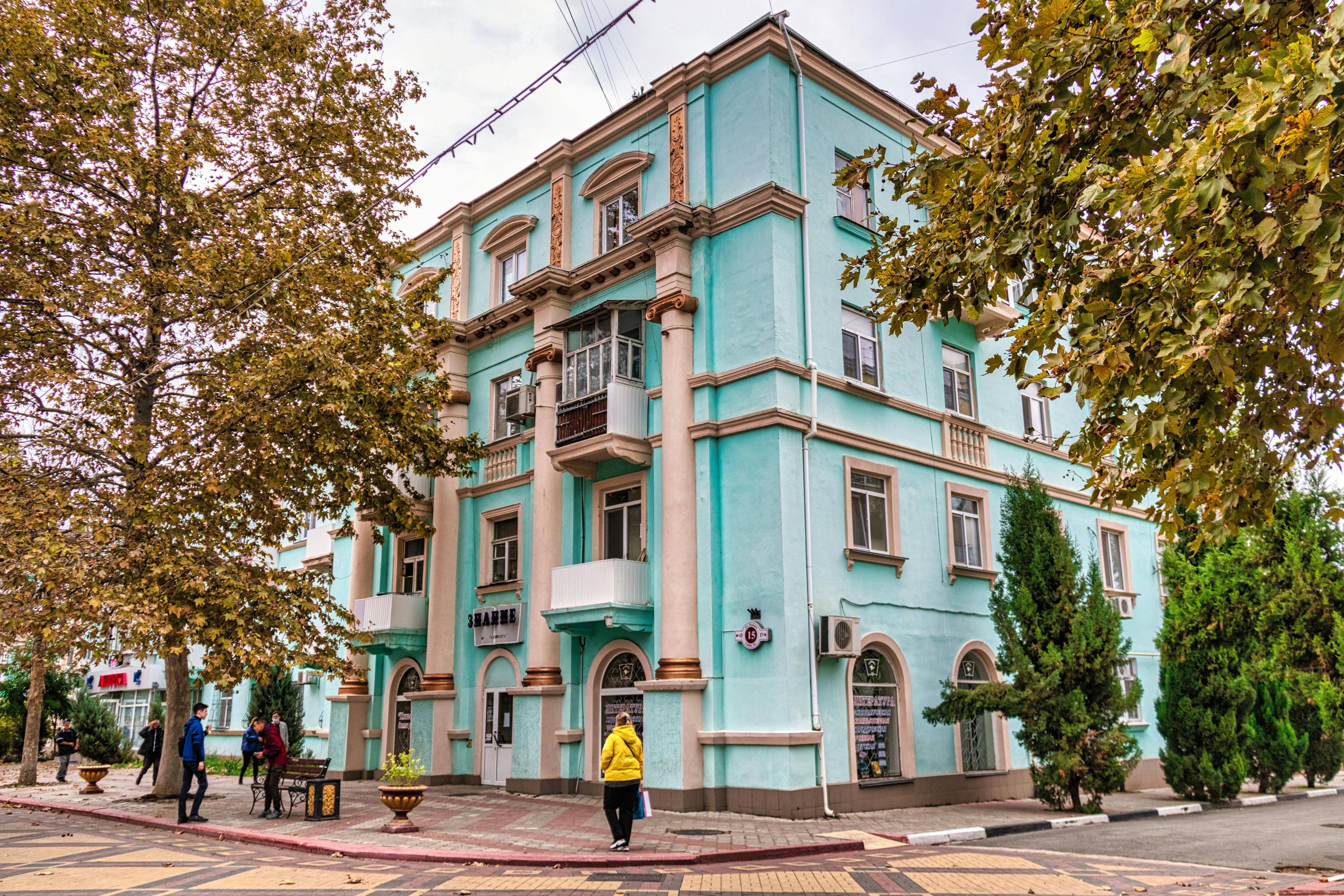 Exterior of a Turquoise Colored Building · Free Stock Photo
