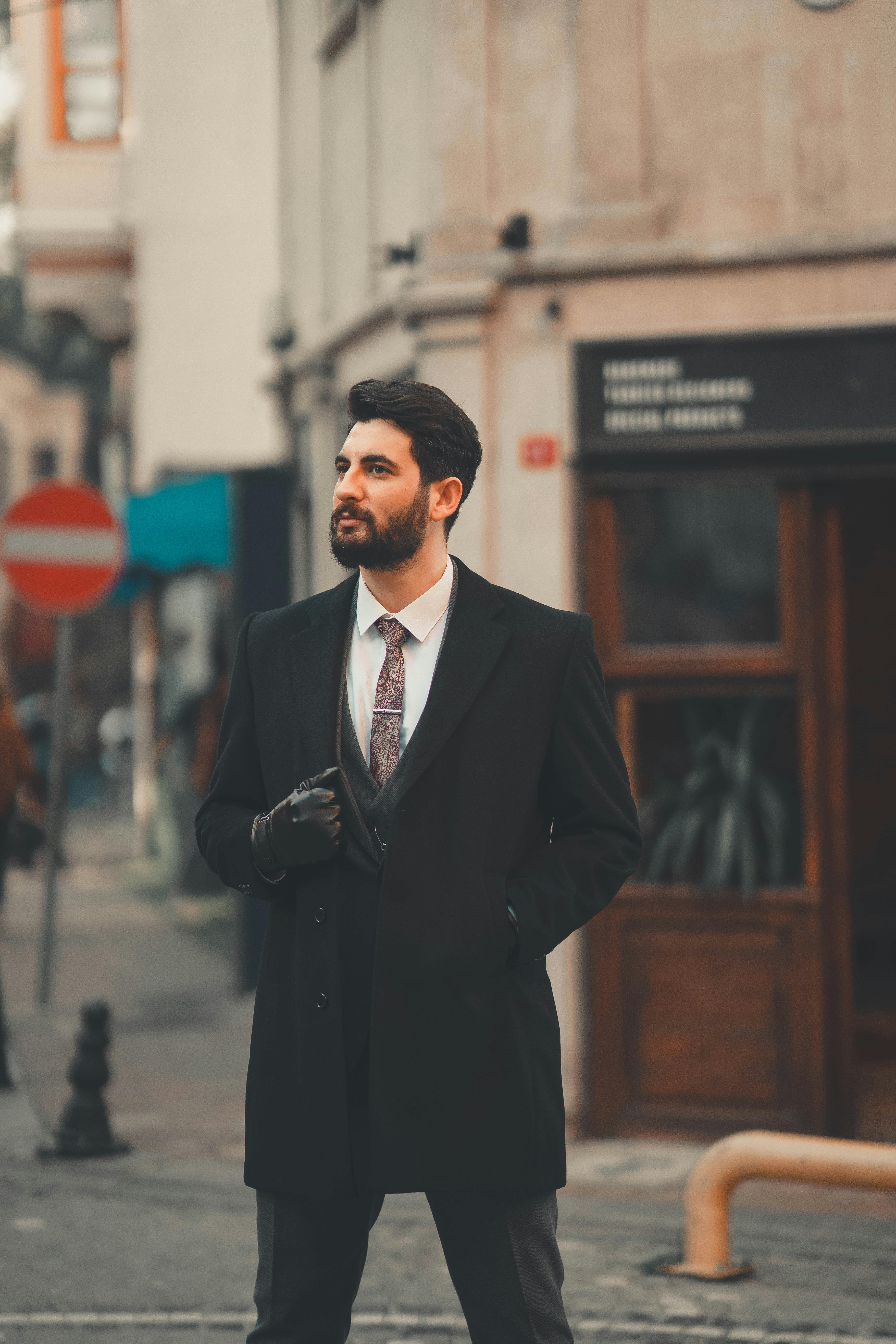 A Rich Man Wearing a White Formal Coat · Free Stock Photo