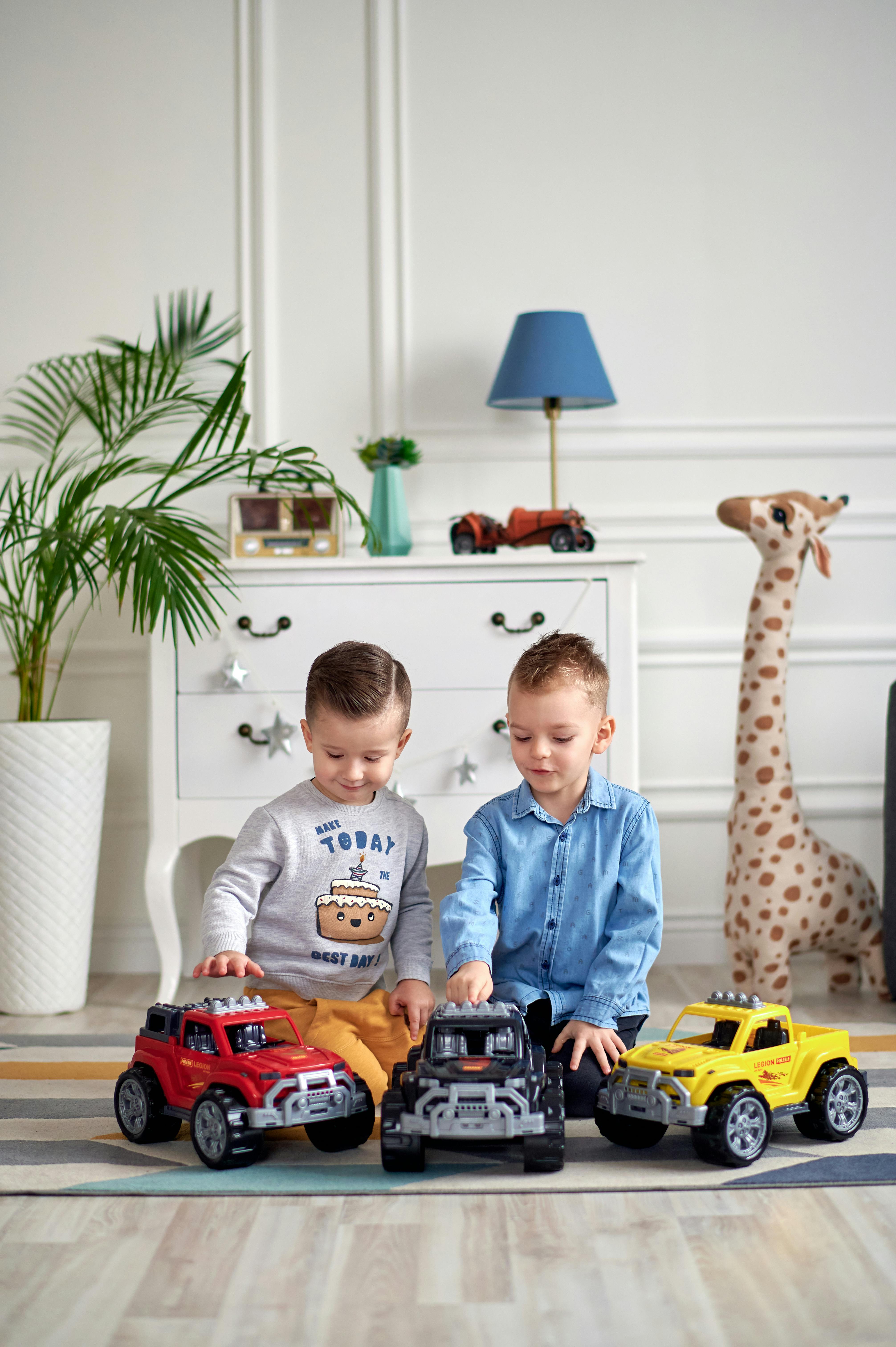 Photograph of Children Playing with Toy Cars · Free Stock Photo