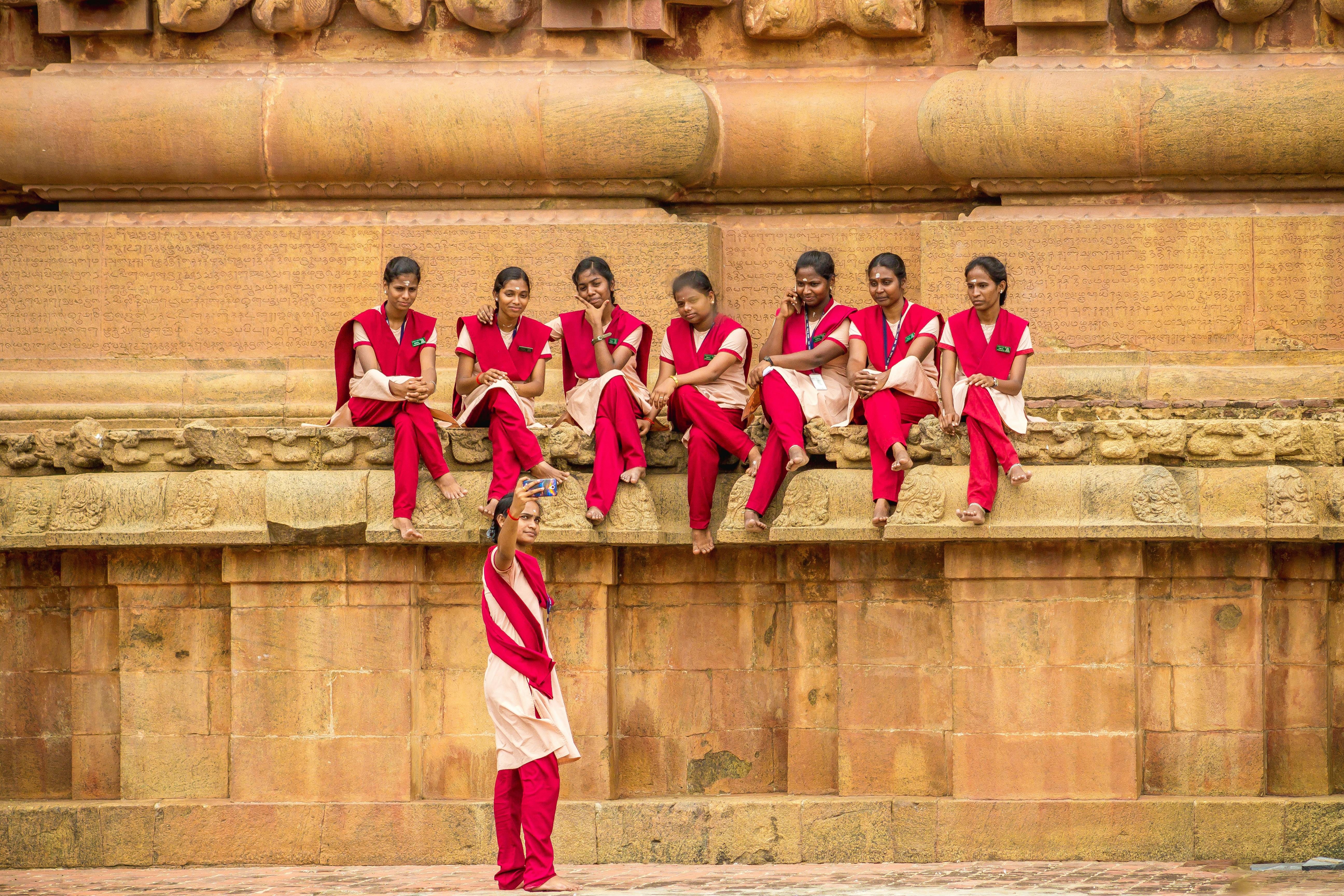 Group Women Wearing Uniforms Taking Picture · Free Stock Photo