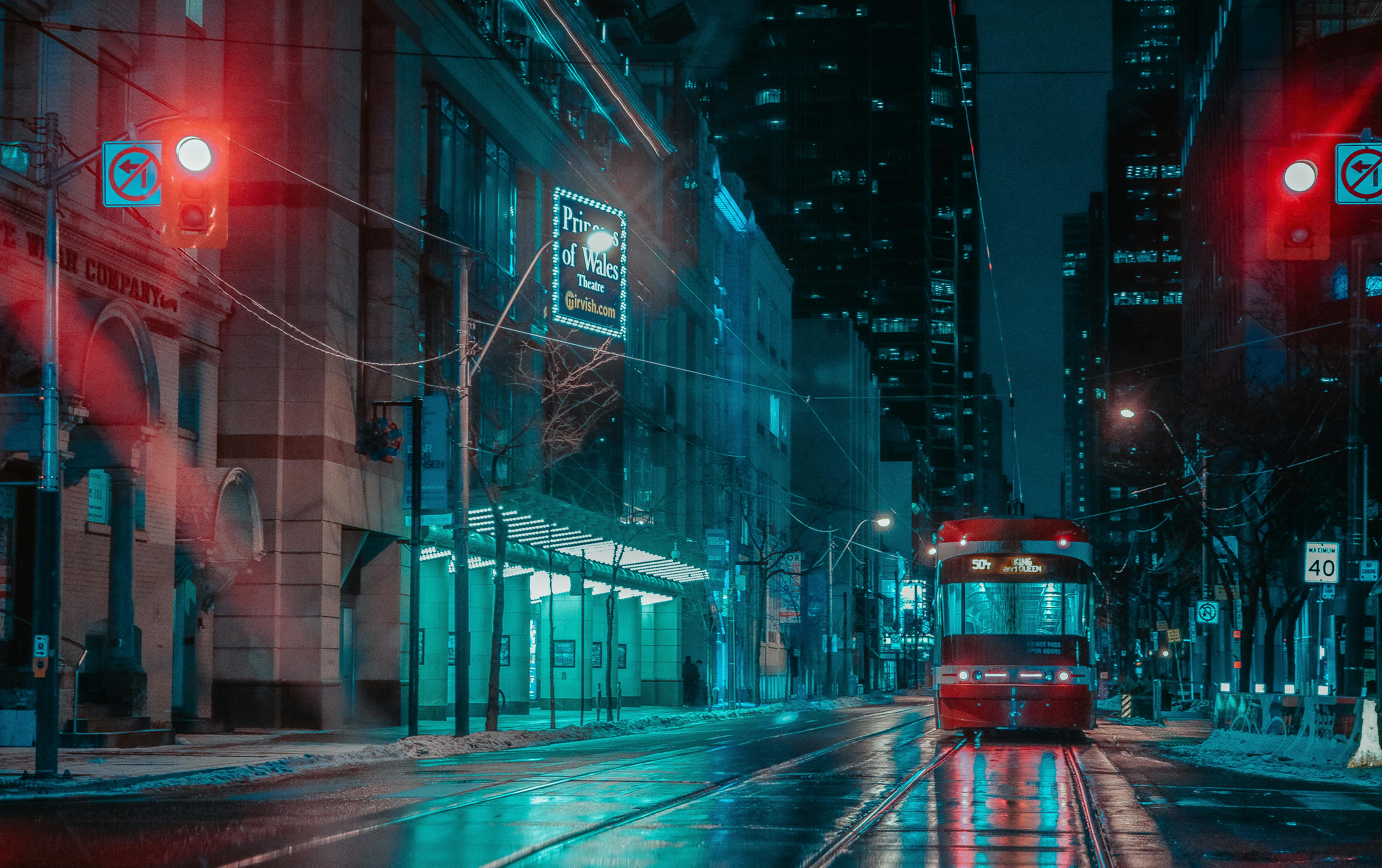 Red Bus on Road during Night Time · Free Stock Photo