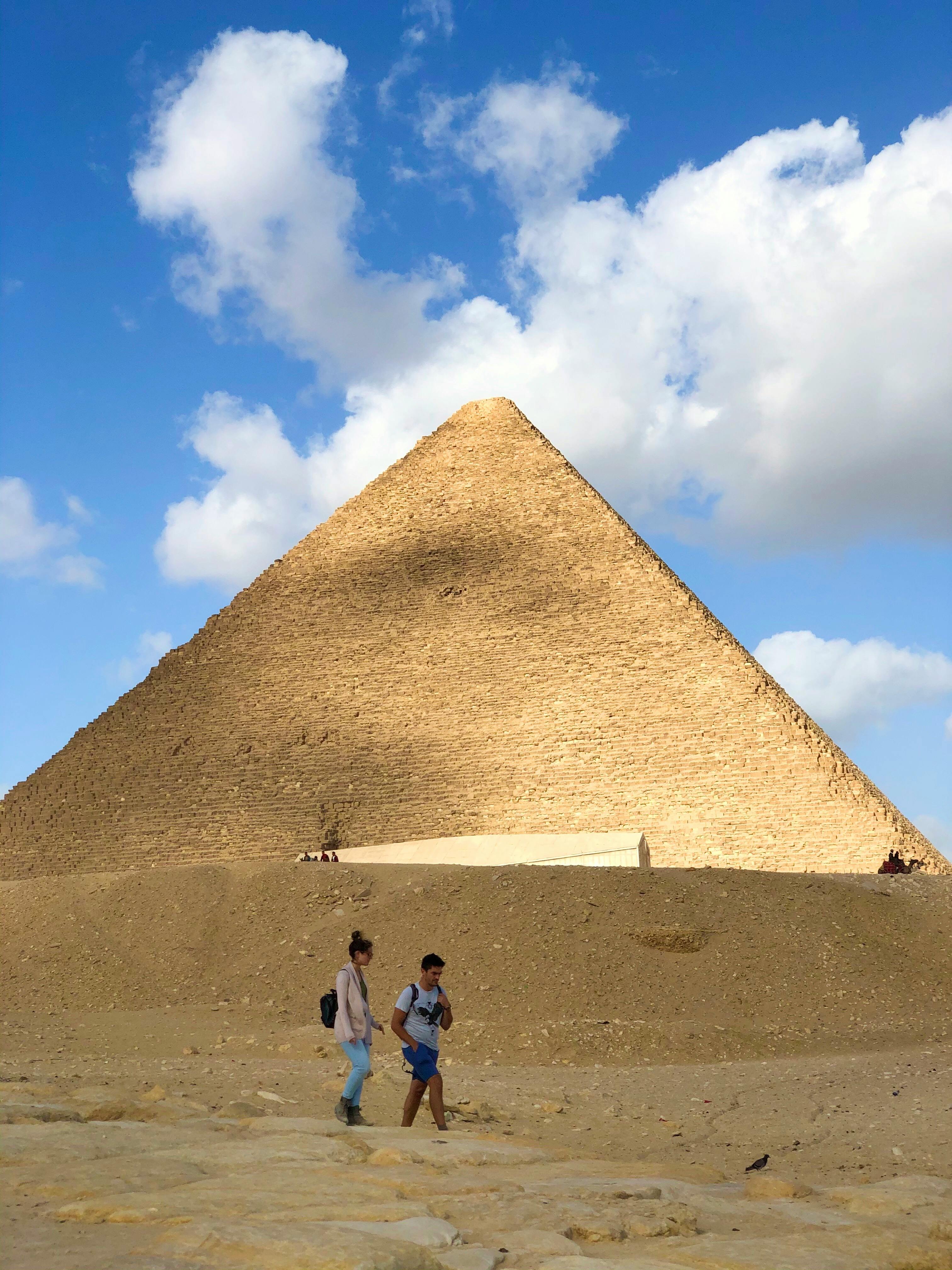 People Walking Near a Pyramid · Free Stock Photo