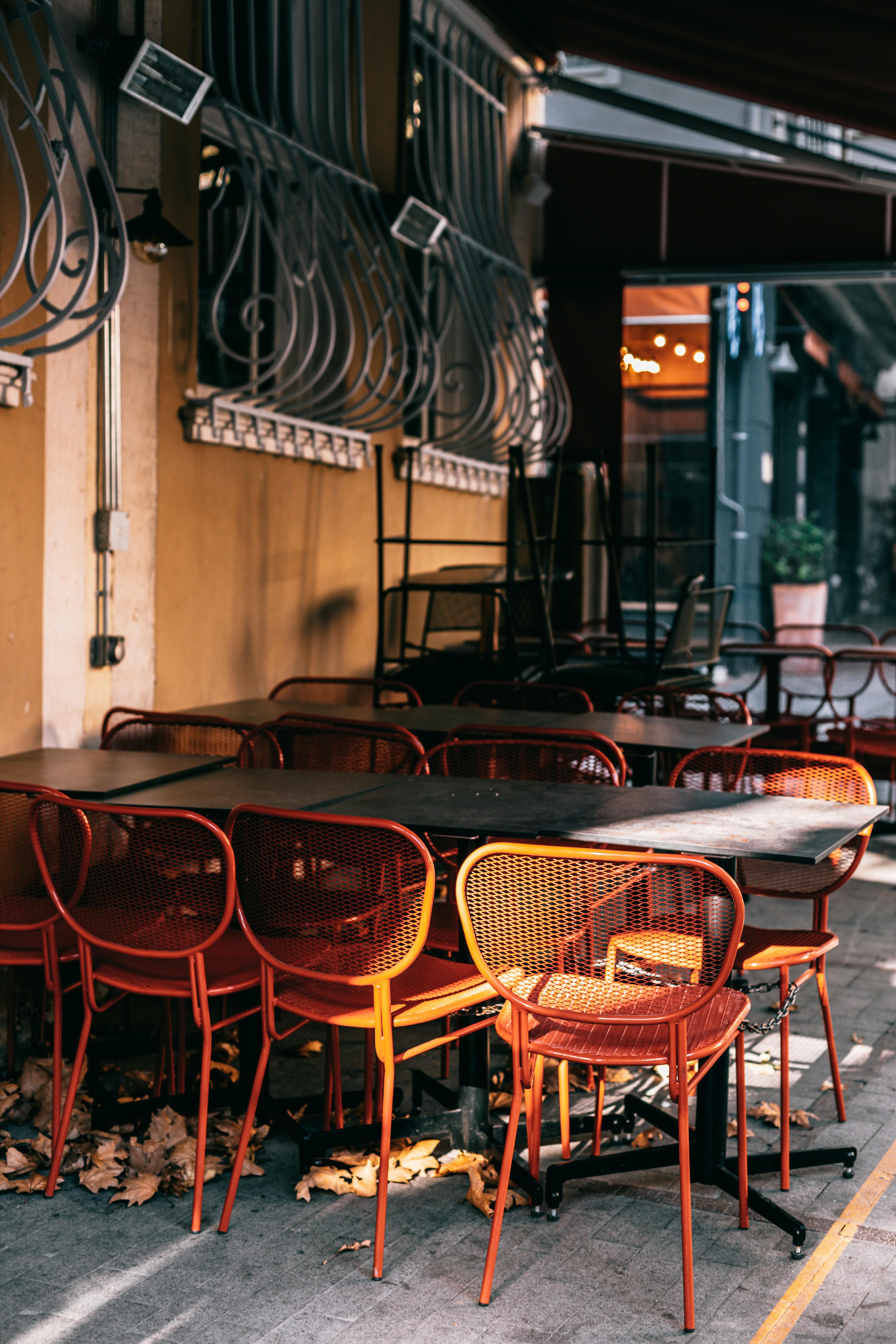 Old empty street cafe with chairs and tables · Free Stock Photo