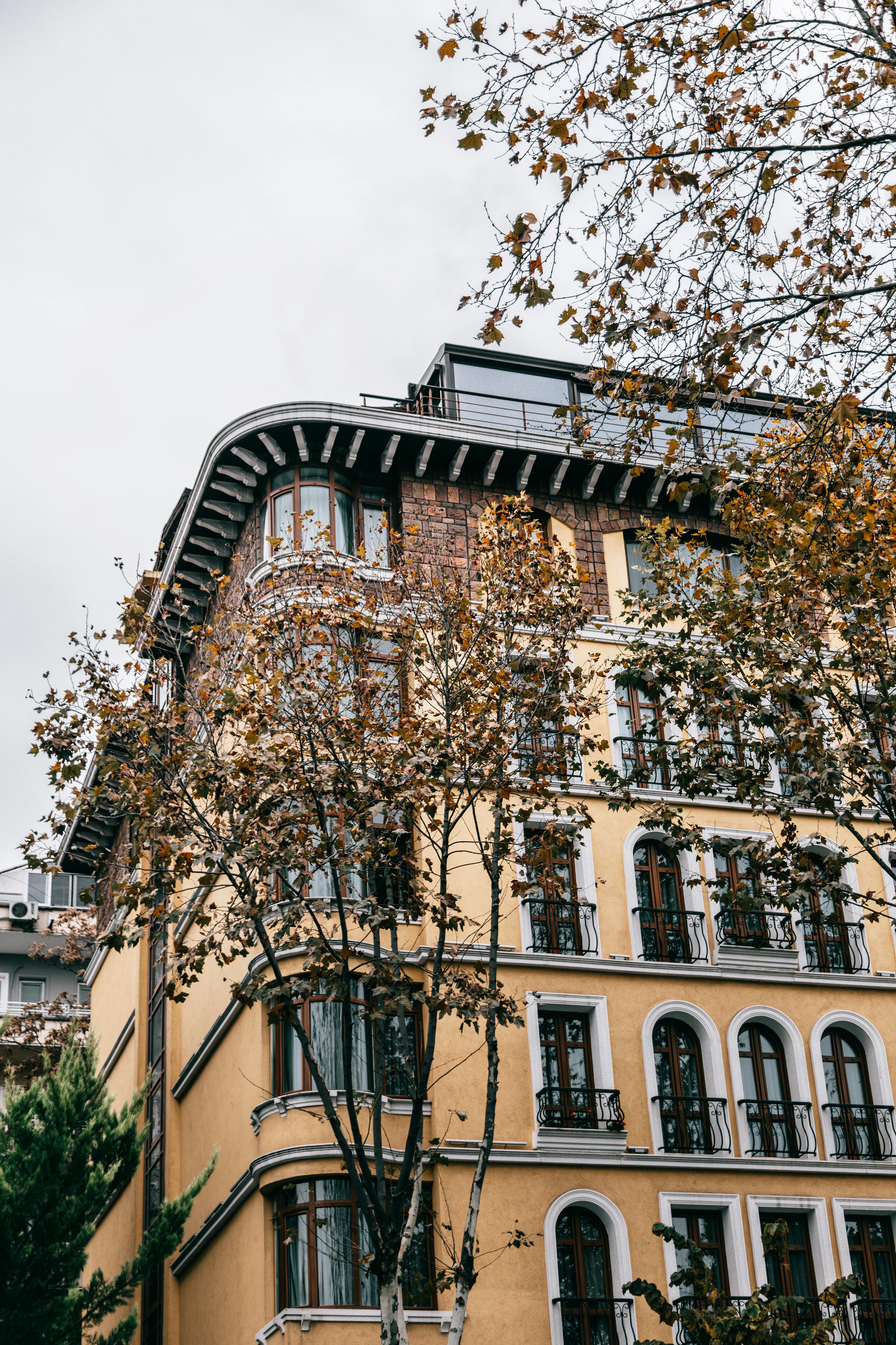 Classic old residential building on autumn day · Free Stock Photo