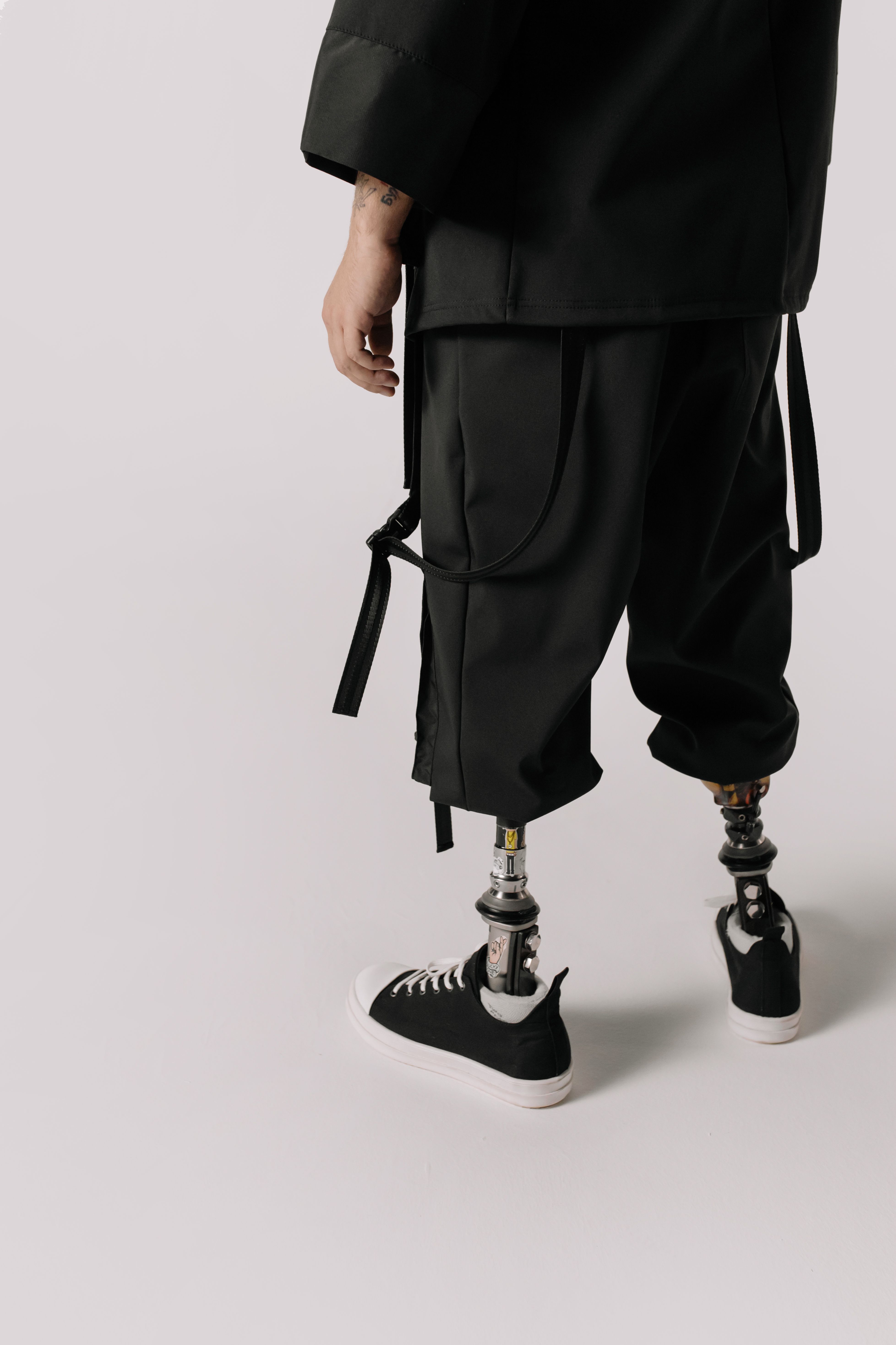 Close-Up Shot of Prosthetic Legs Wearing Sneakers · Free Stock Photo