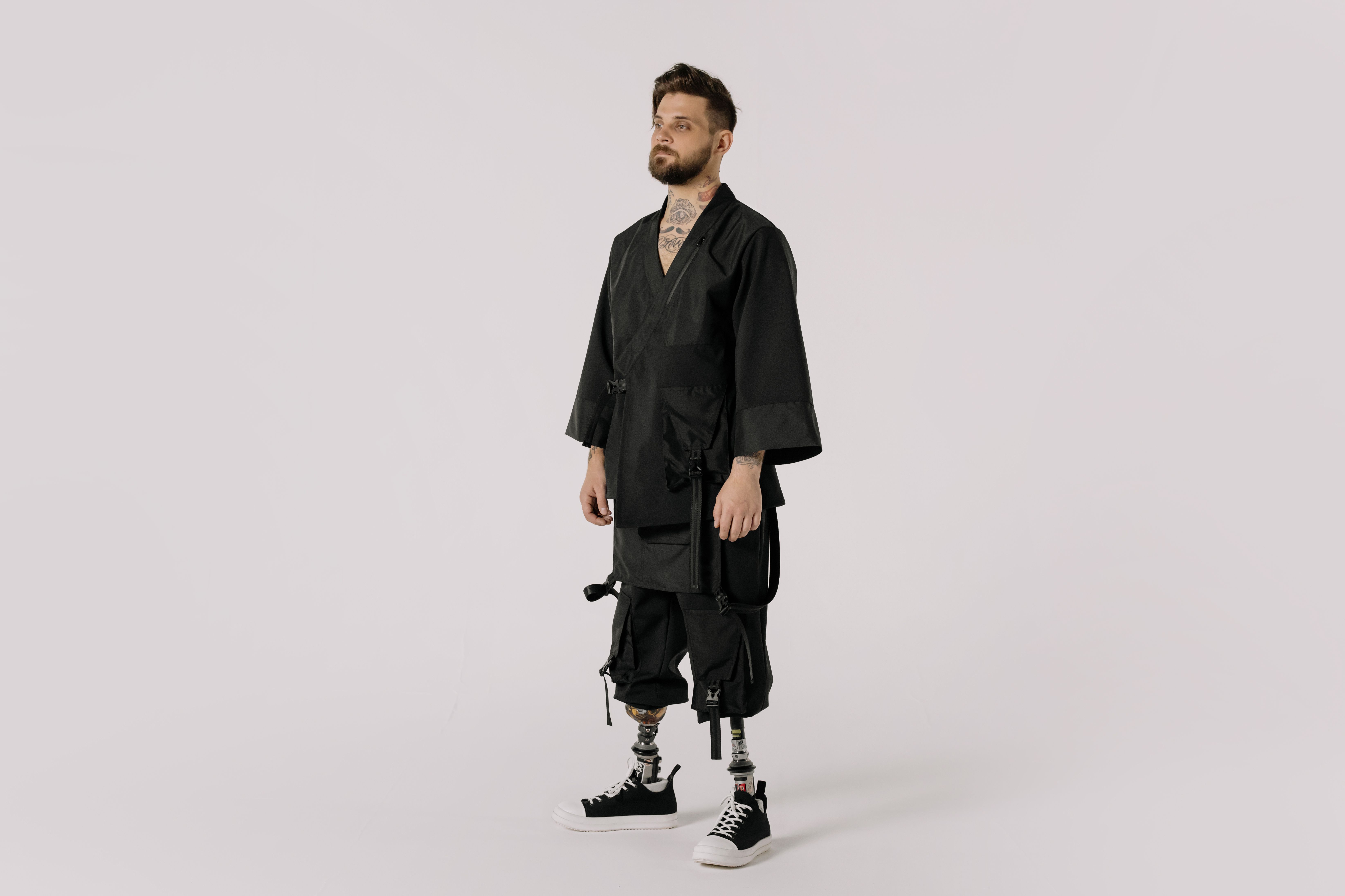A Man Carrying a Chair · Free Stock Photo