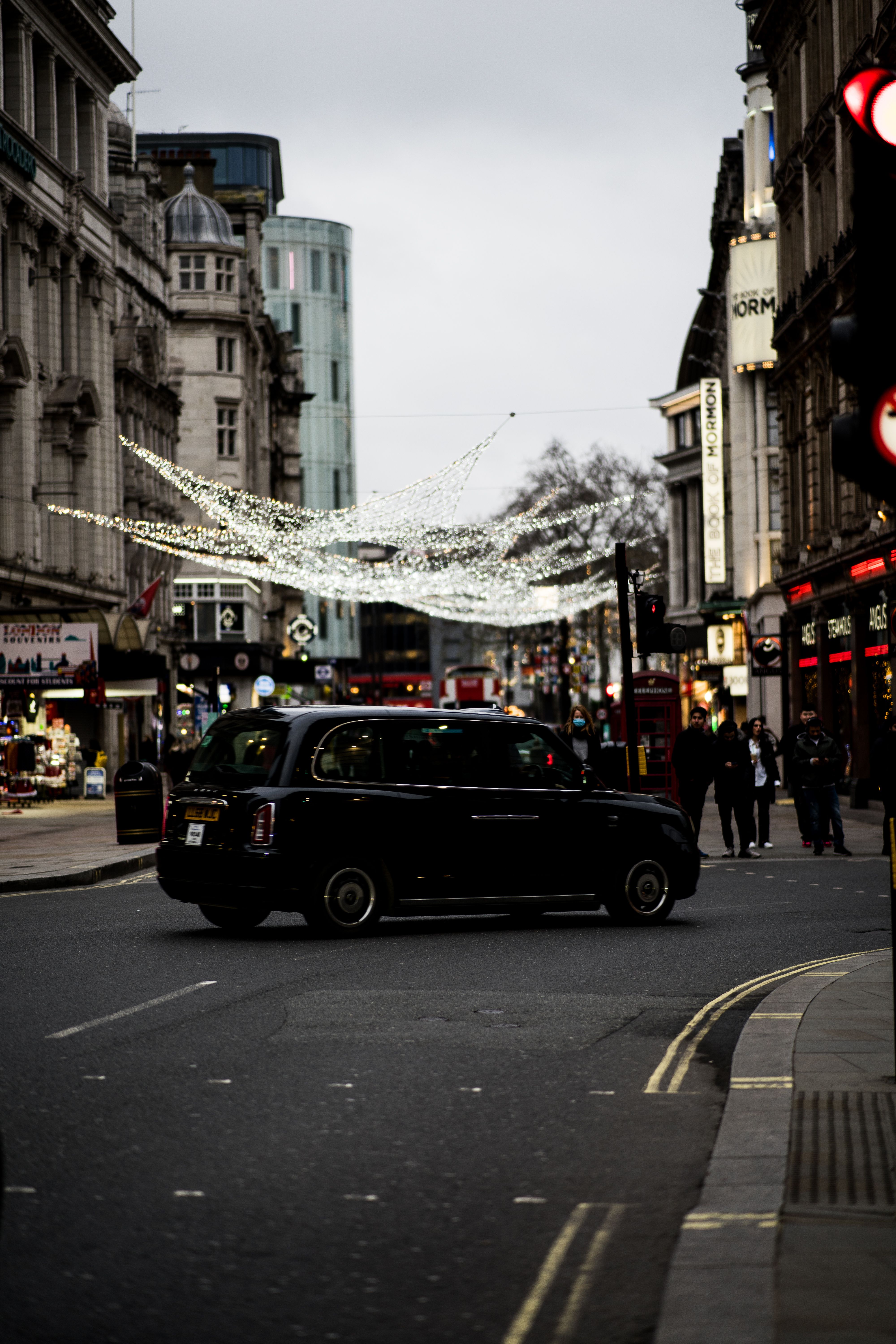 A Red Taxi on Road during Nighttime · Free Stock Photo