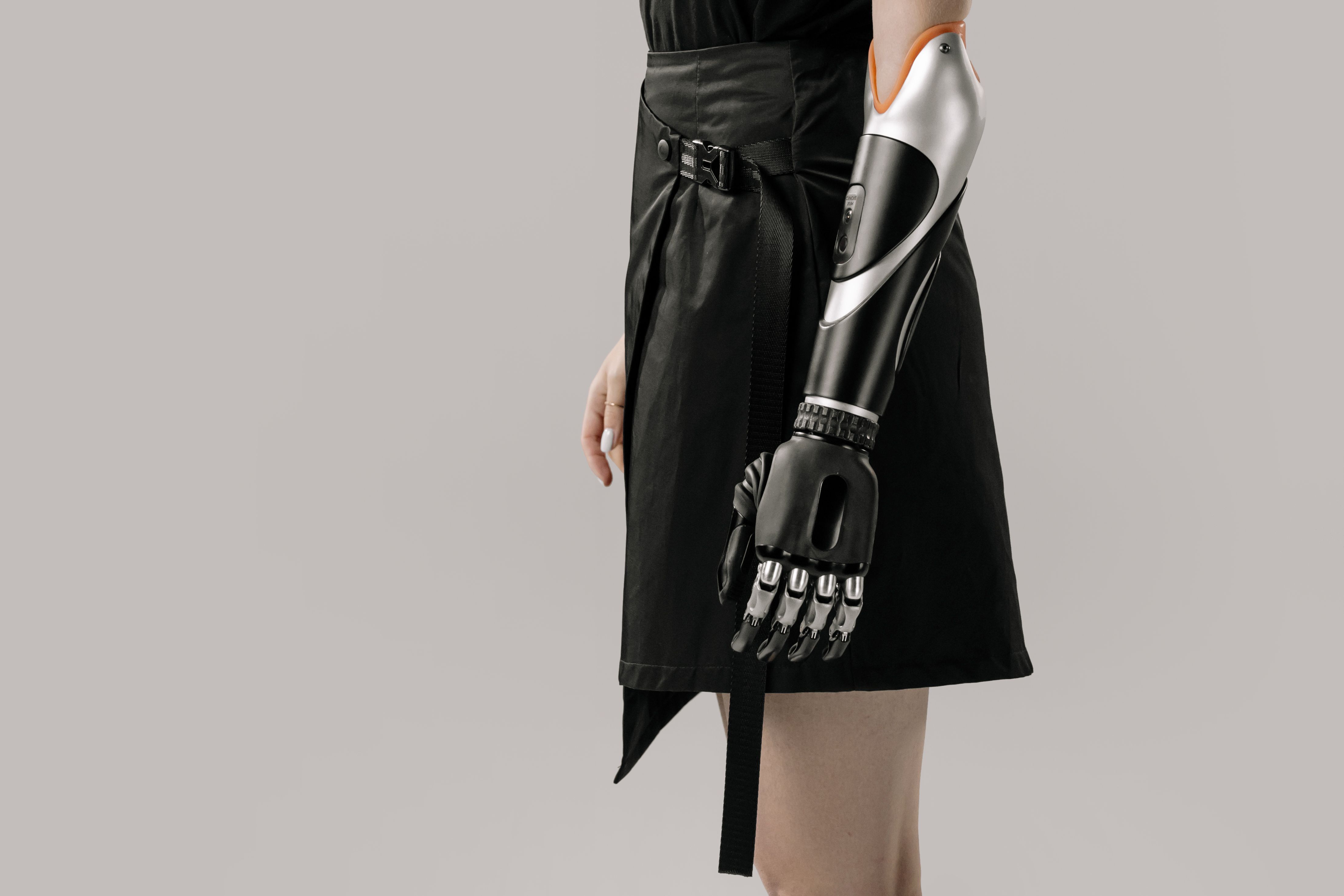 A Person Holding a Prosthetic Arm · Free Stock Photo