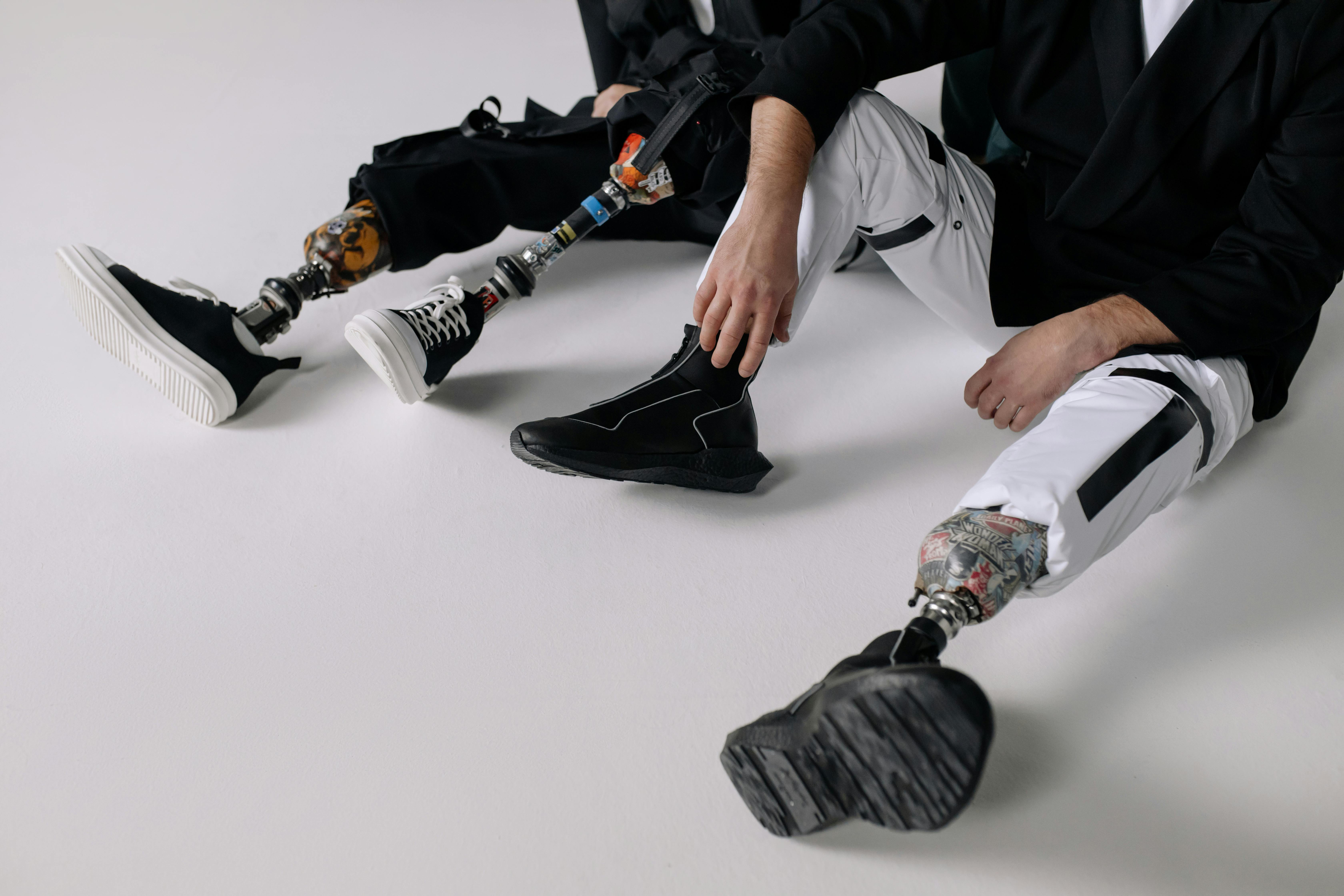 Prosthetic Arm on Blue Background · Free Stock Photo