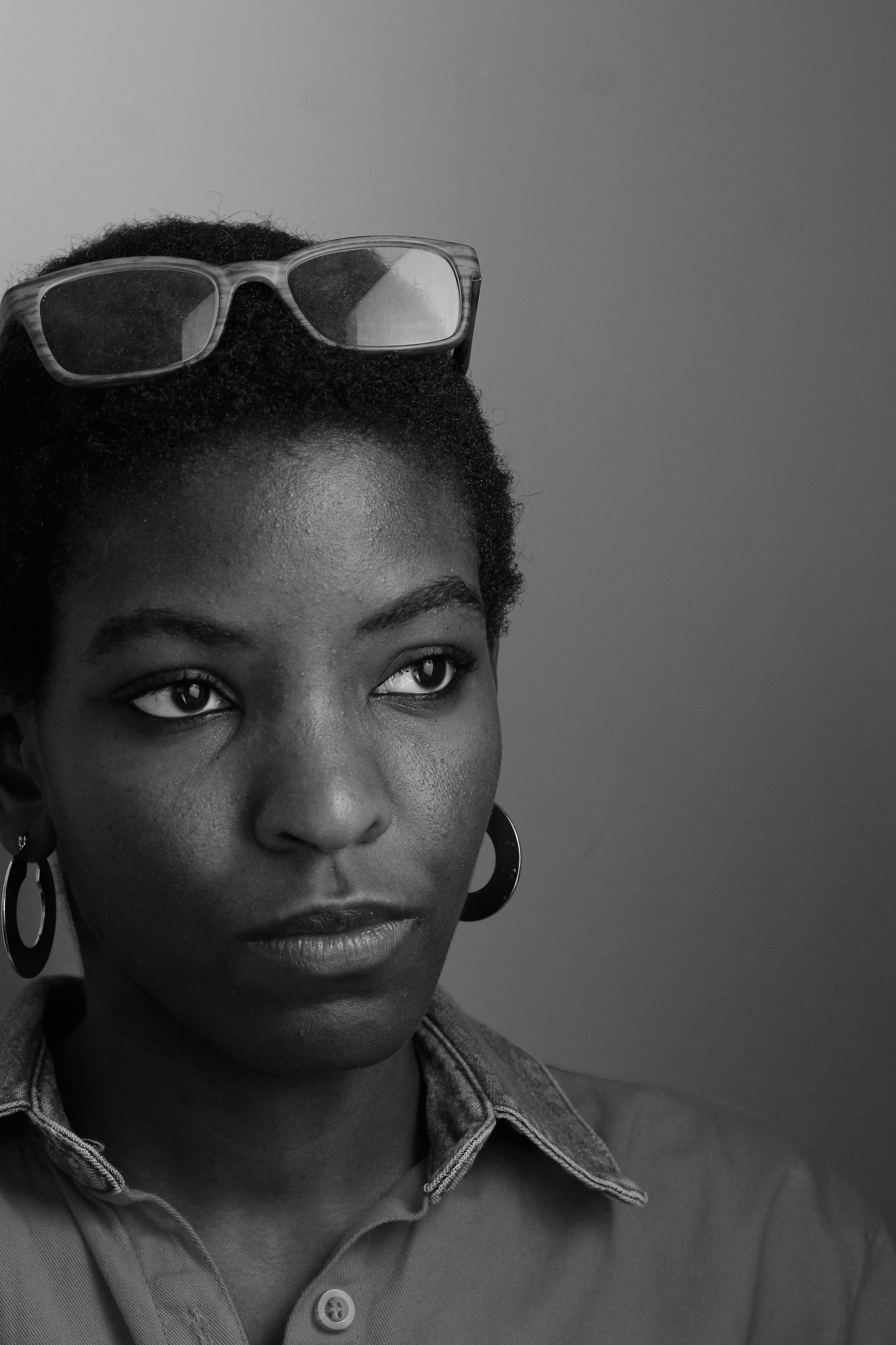 Crop pondering black woman in dark room · Free Stock Photo