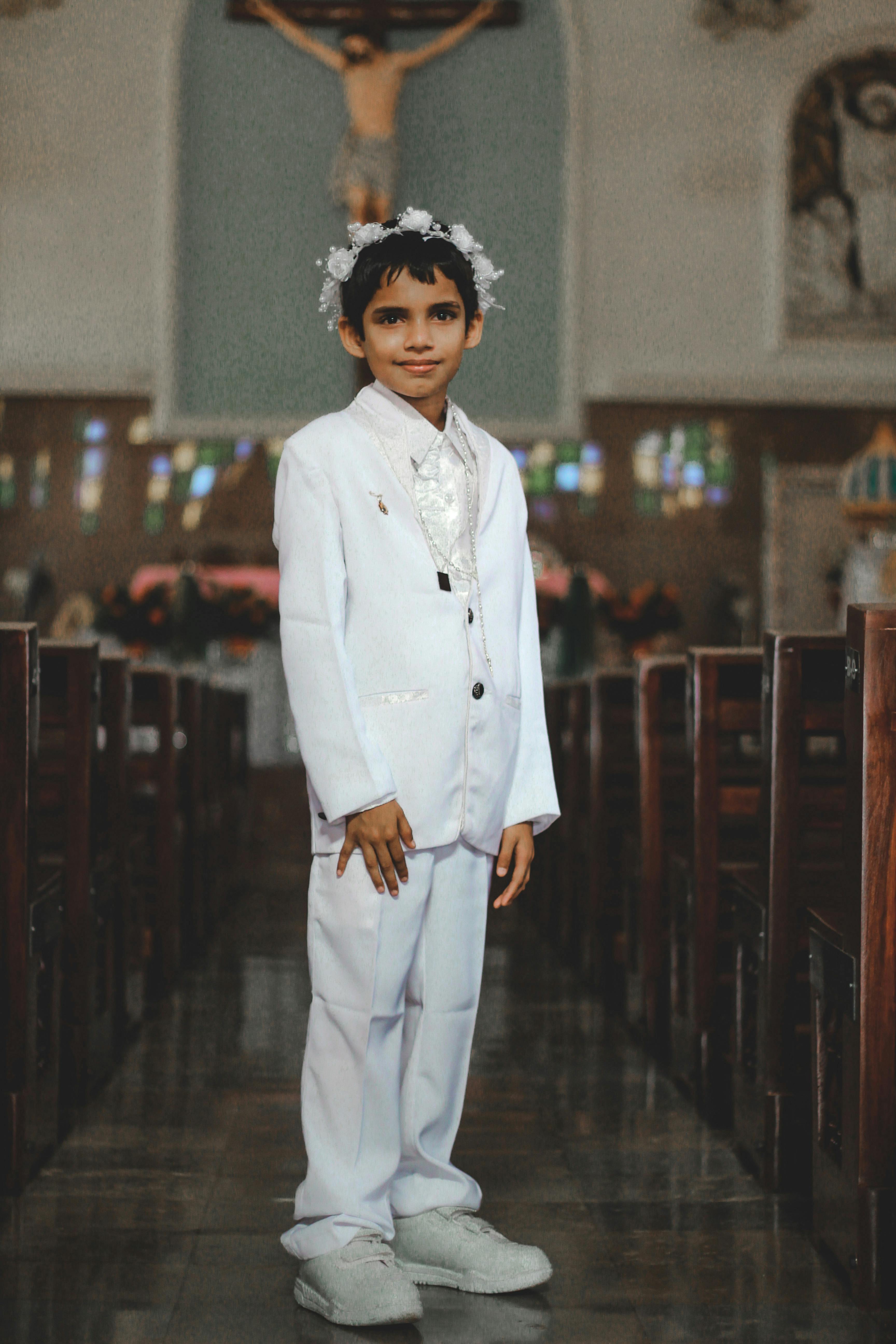 Boy in Religious Dress Standing in Orthodox Church · Free Stock Photo