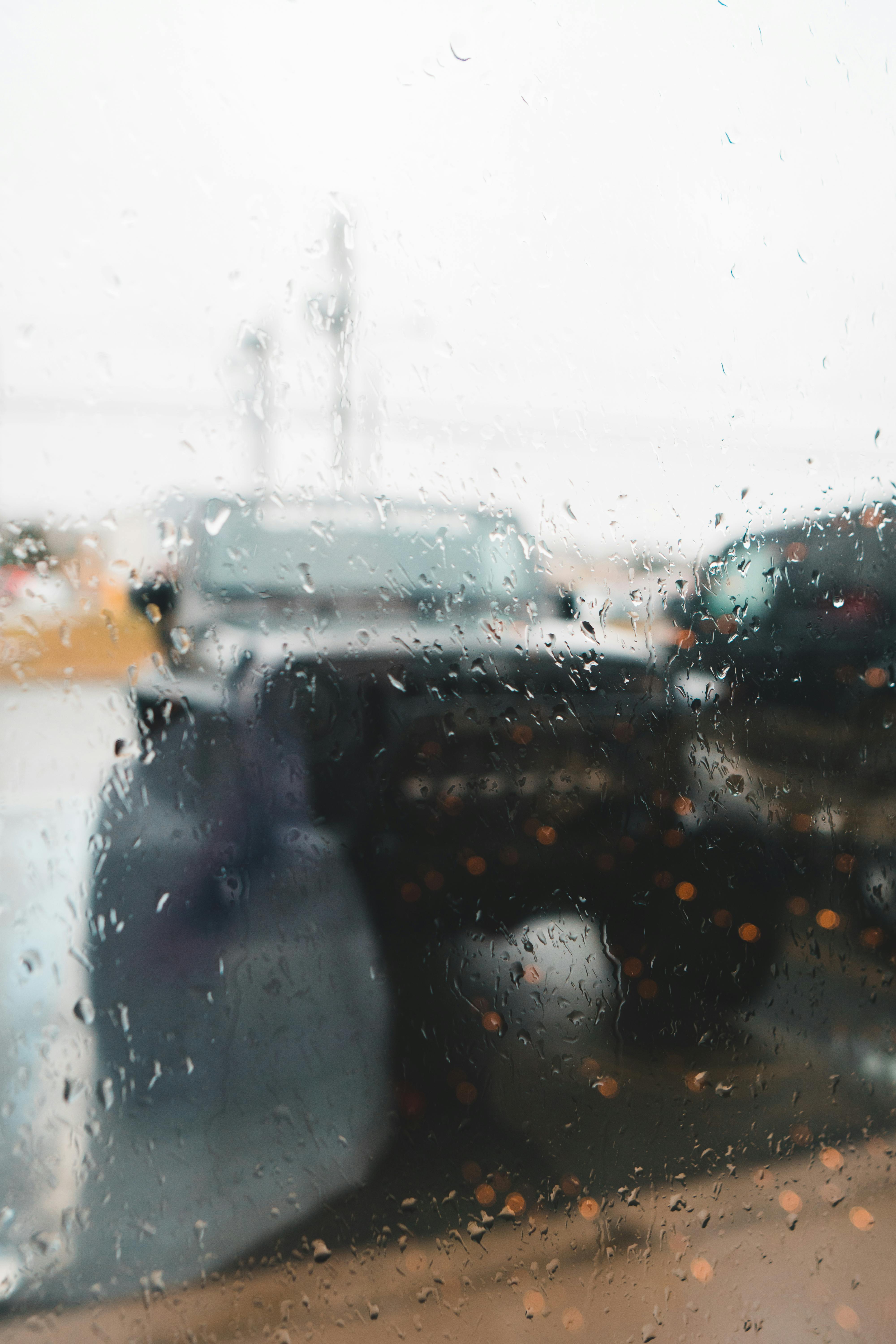 Background of droplets on window during rain · Free Stock Photo