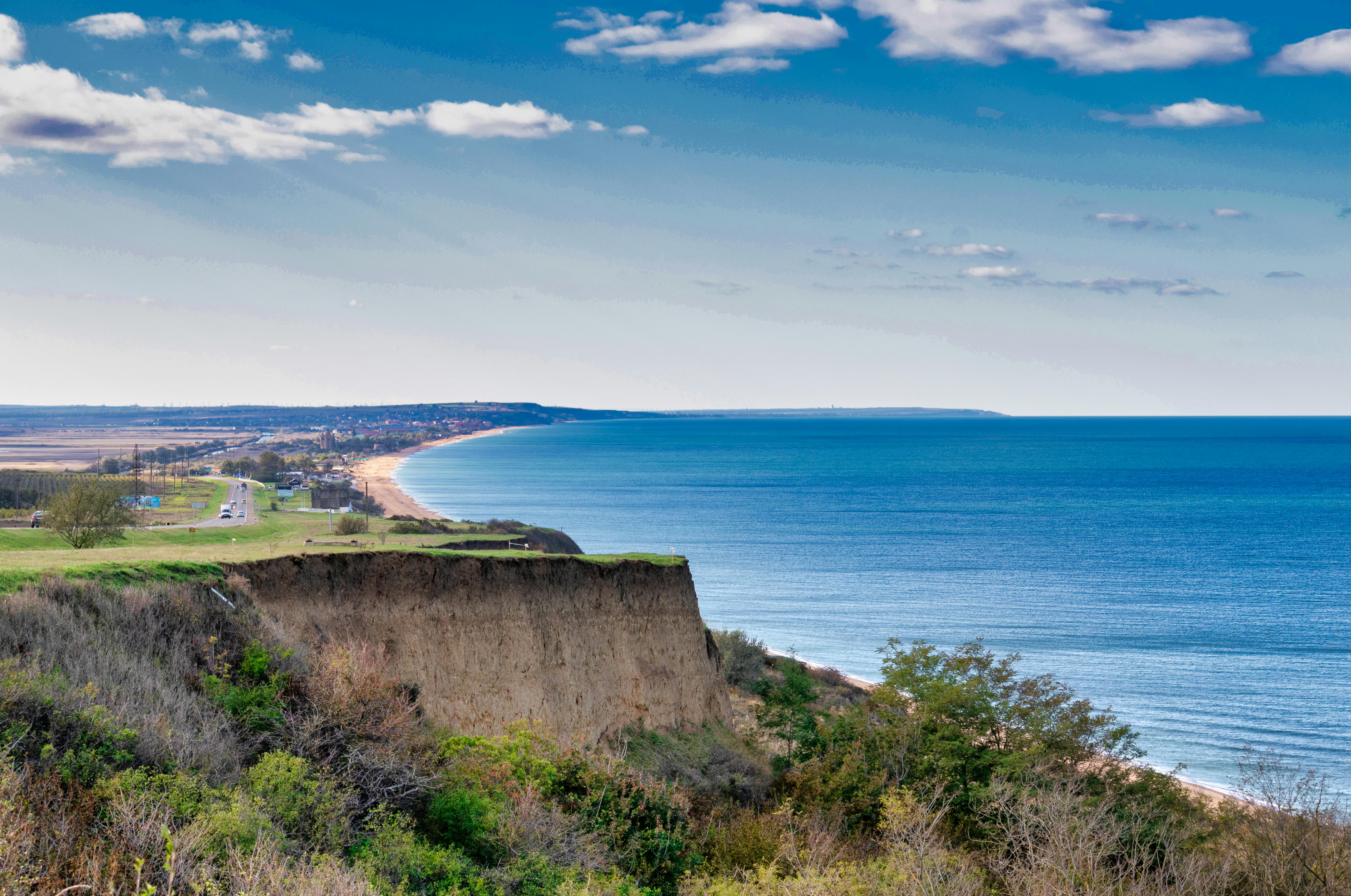 Cliff and the Sea Coastline · Free Stock Photo