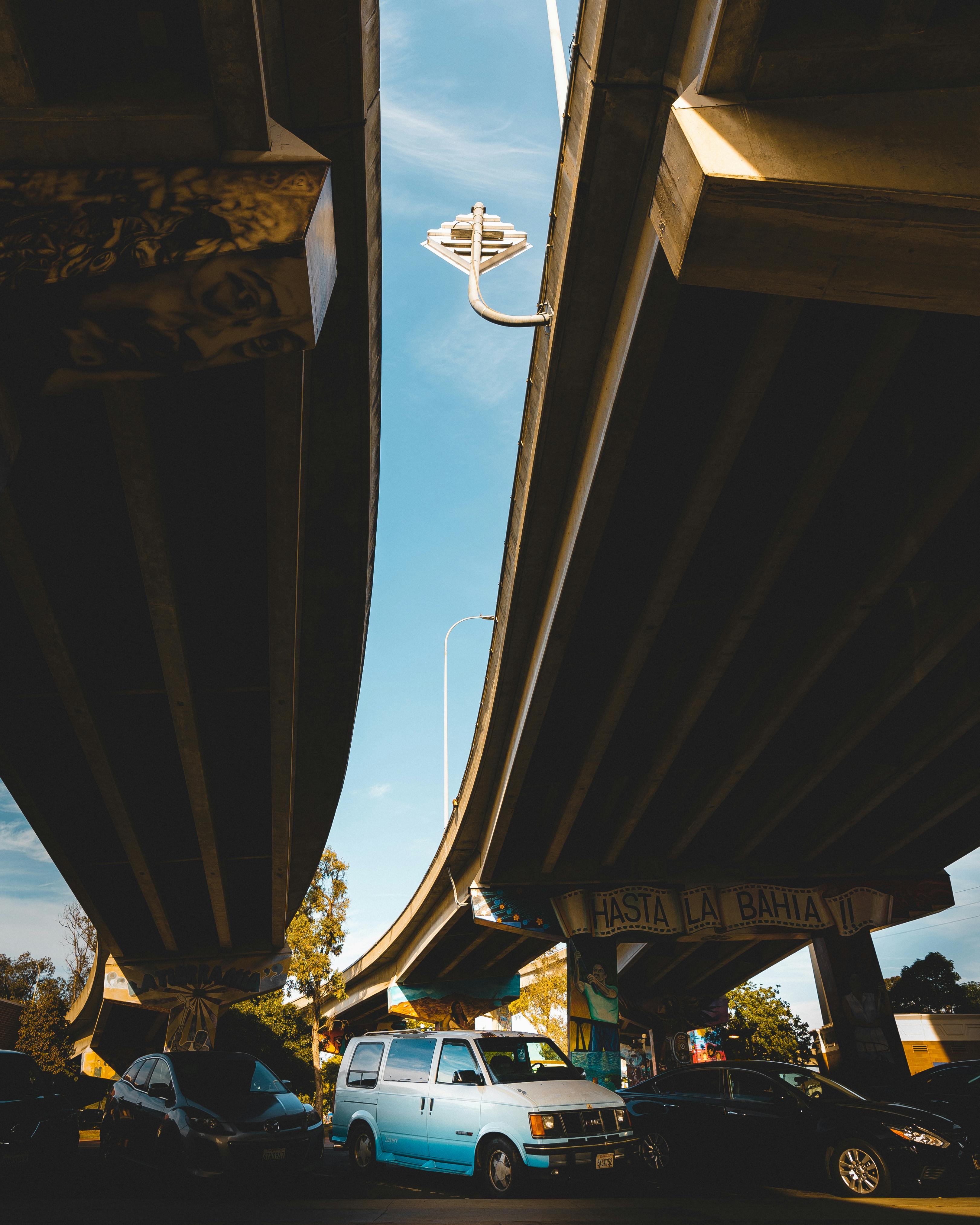 Cars on Road under Bridge · Free Stock Photo