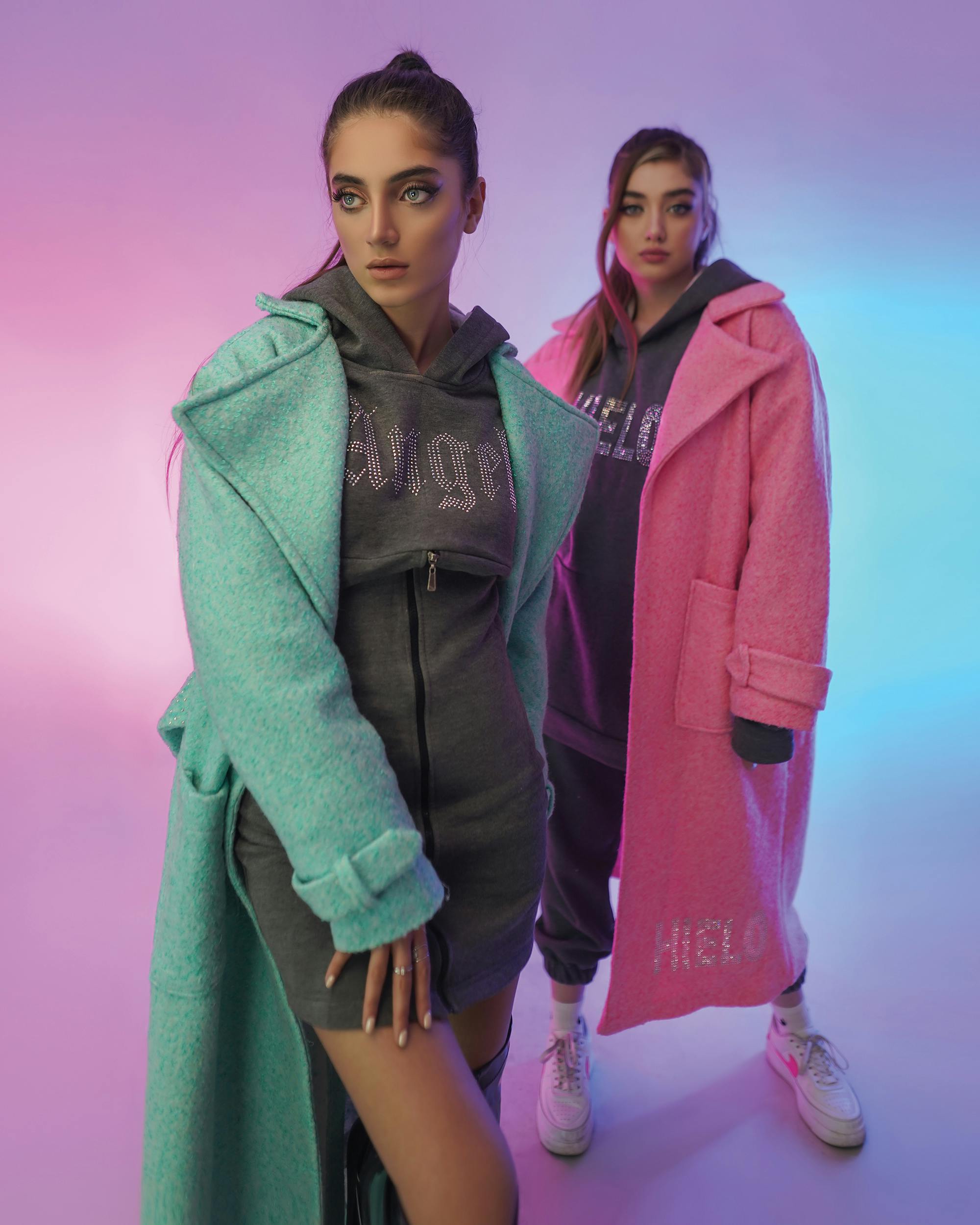 Stylish women in colorful coats · Free Stock Photo