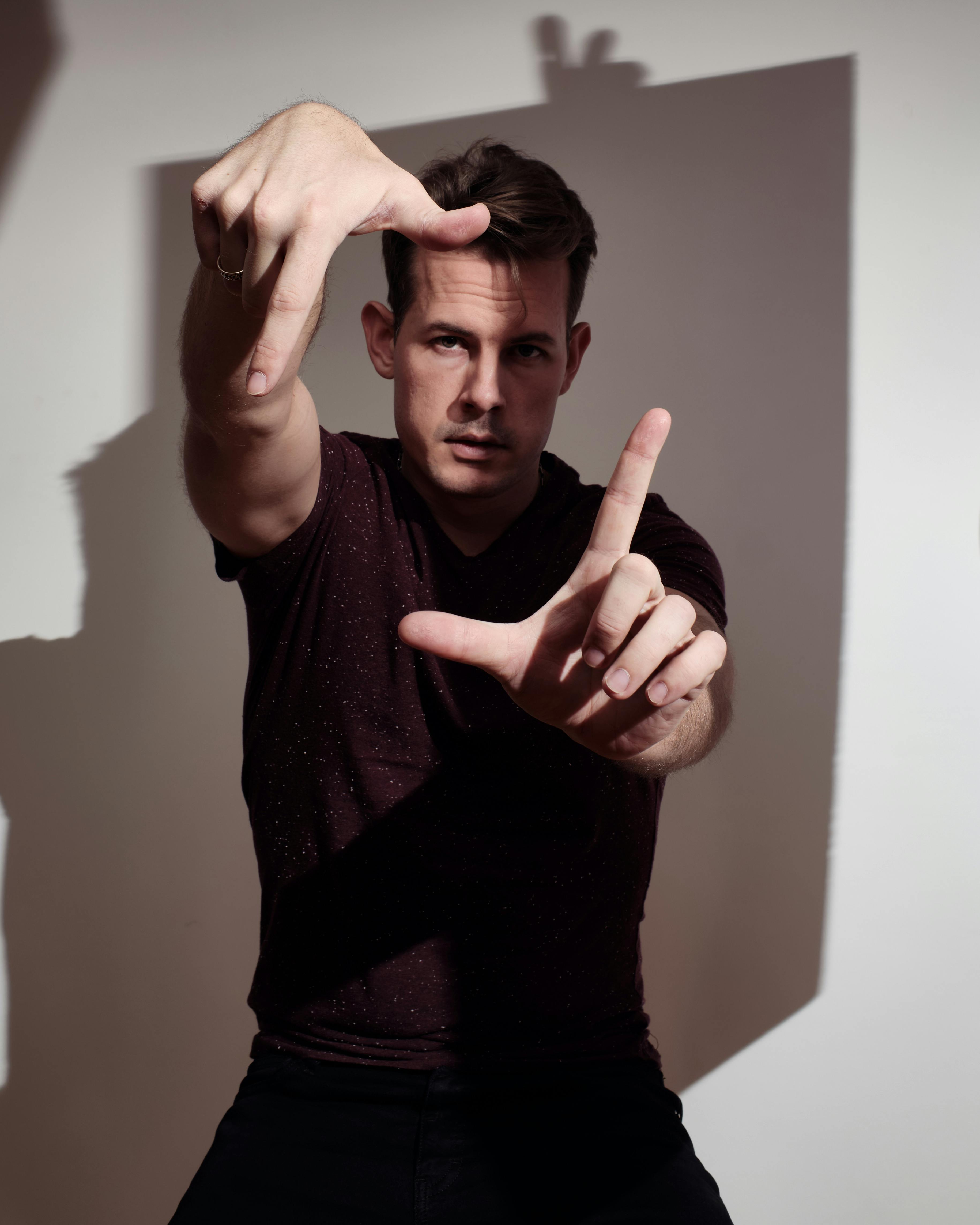 A Man Posing at the Camera · Free Stock Photo