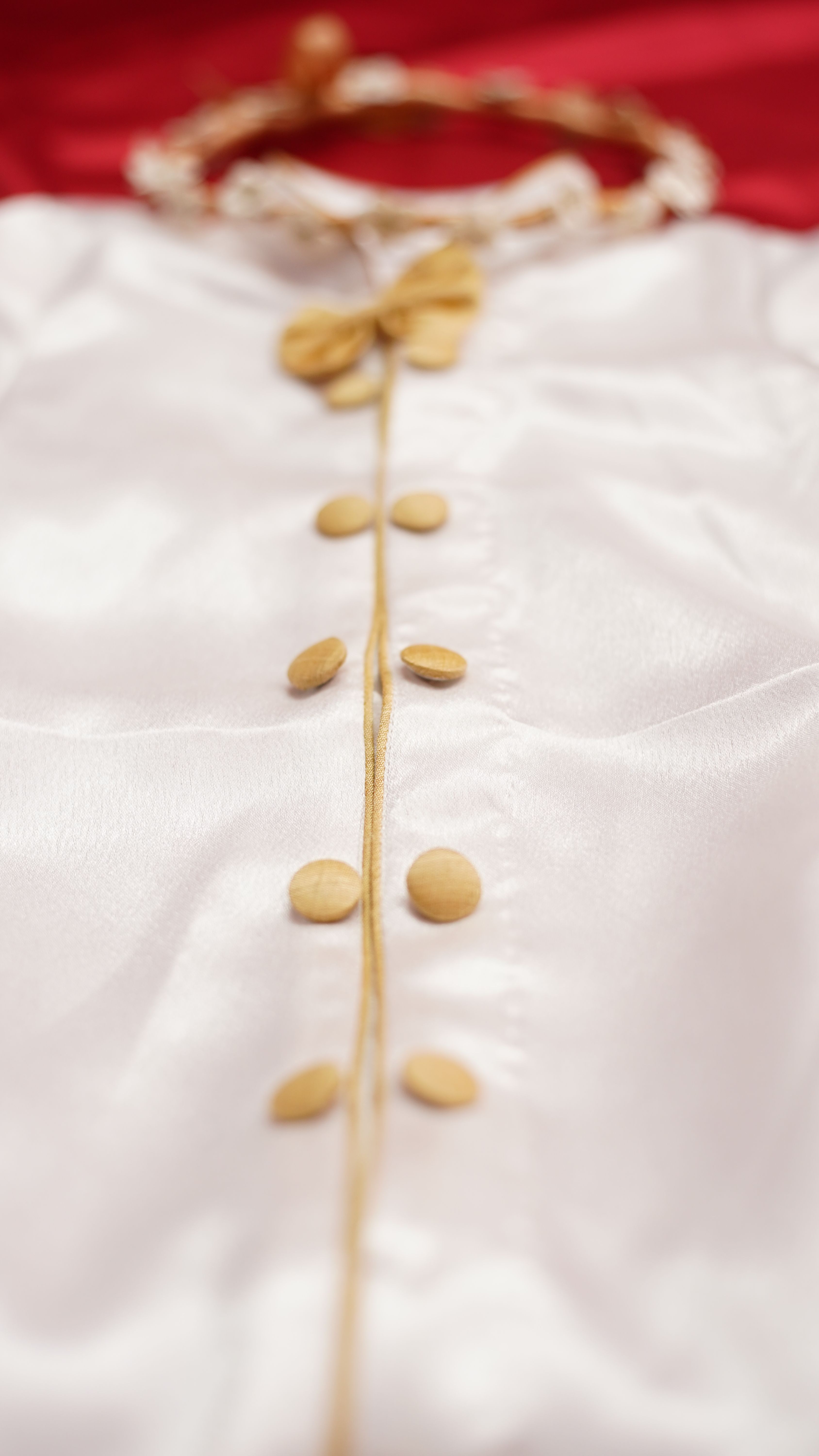 Baptism Dress with Gold Buttons · Free Stock Photo