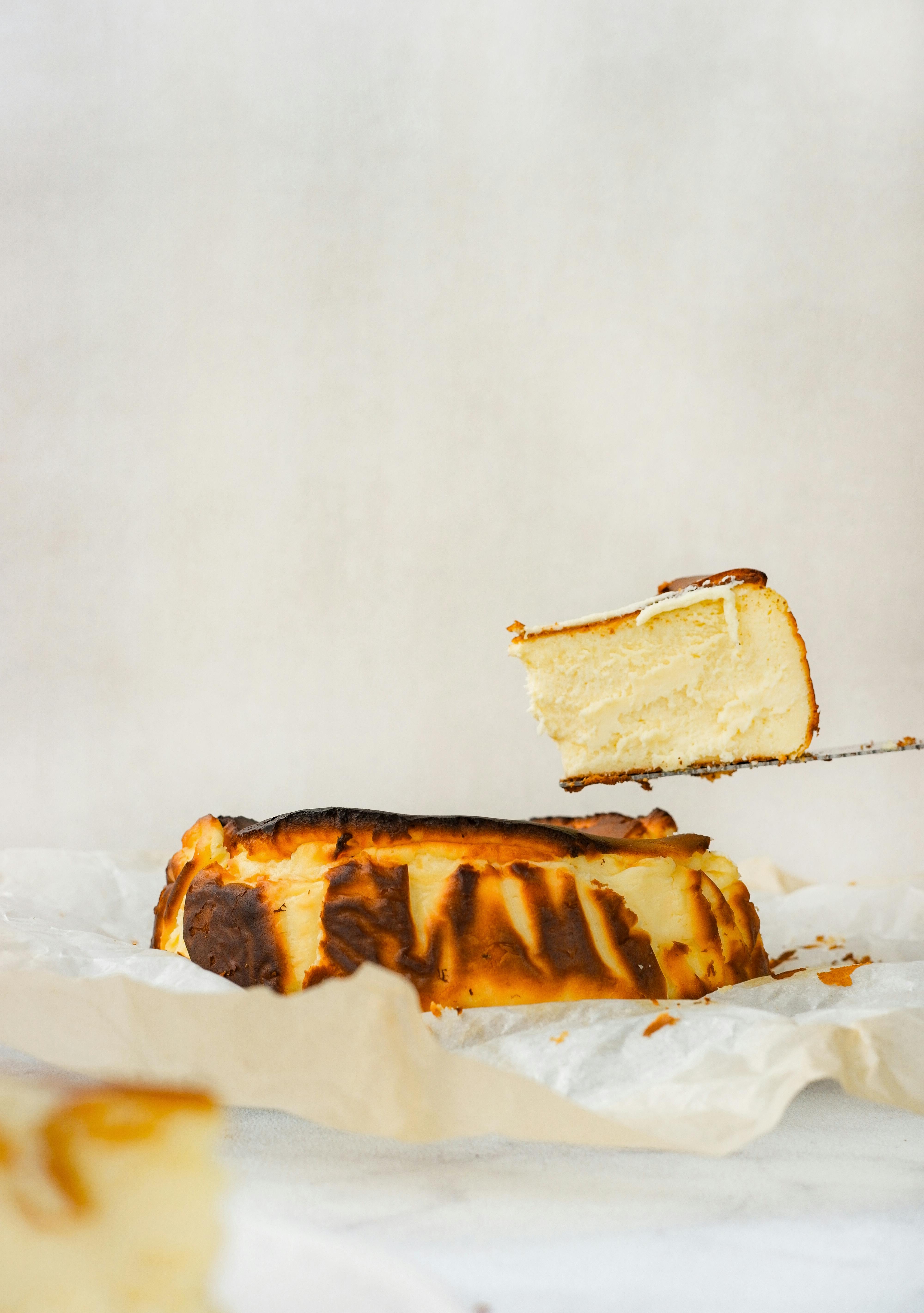 Delicious Basque Cheesecake on Crumpled Paper · Free Stock Photo