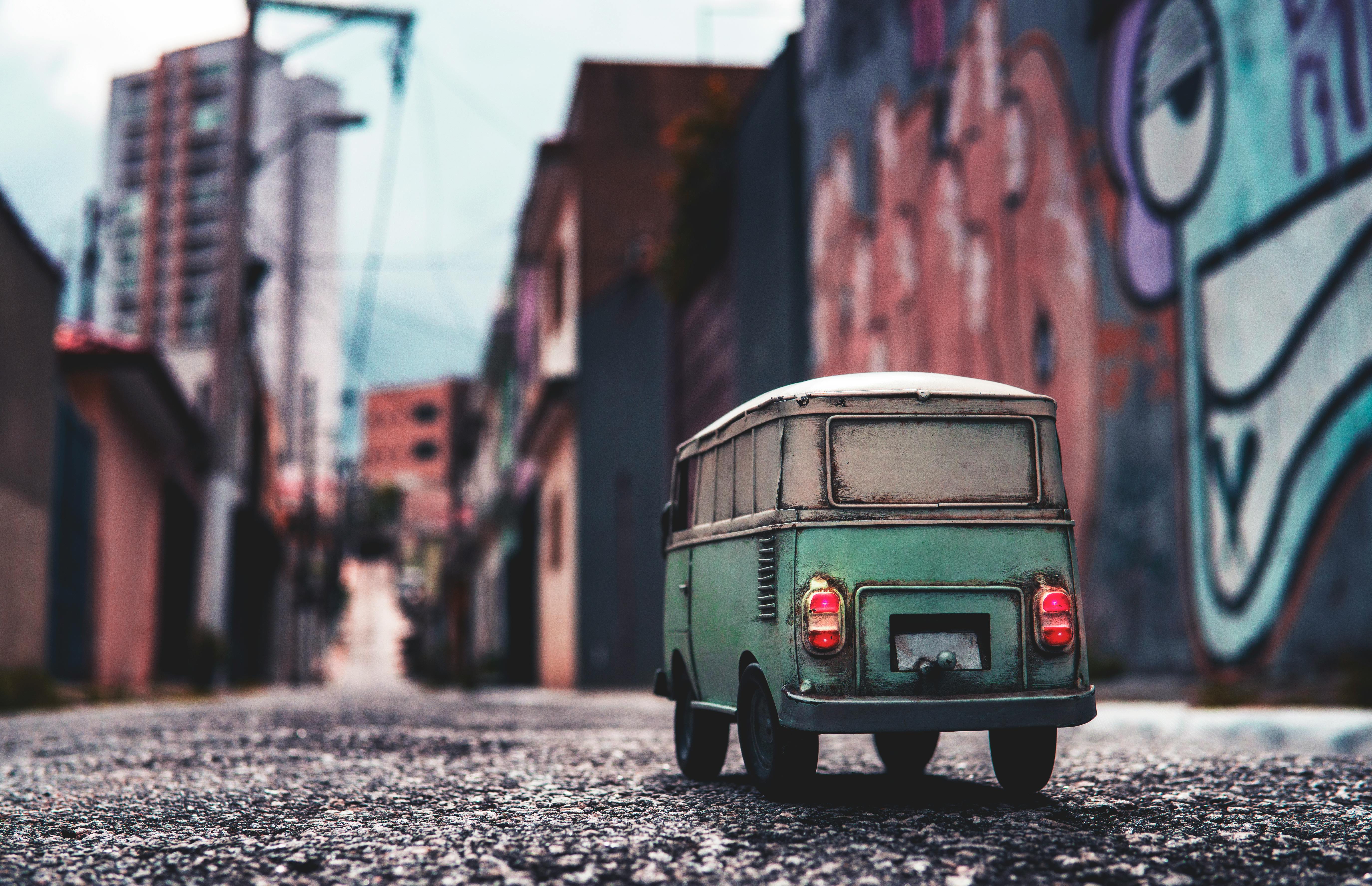 Selective Focus Photo of Tiny Toy Van · Free Stock Photo