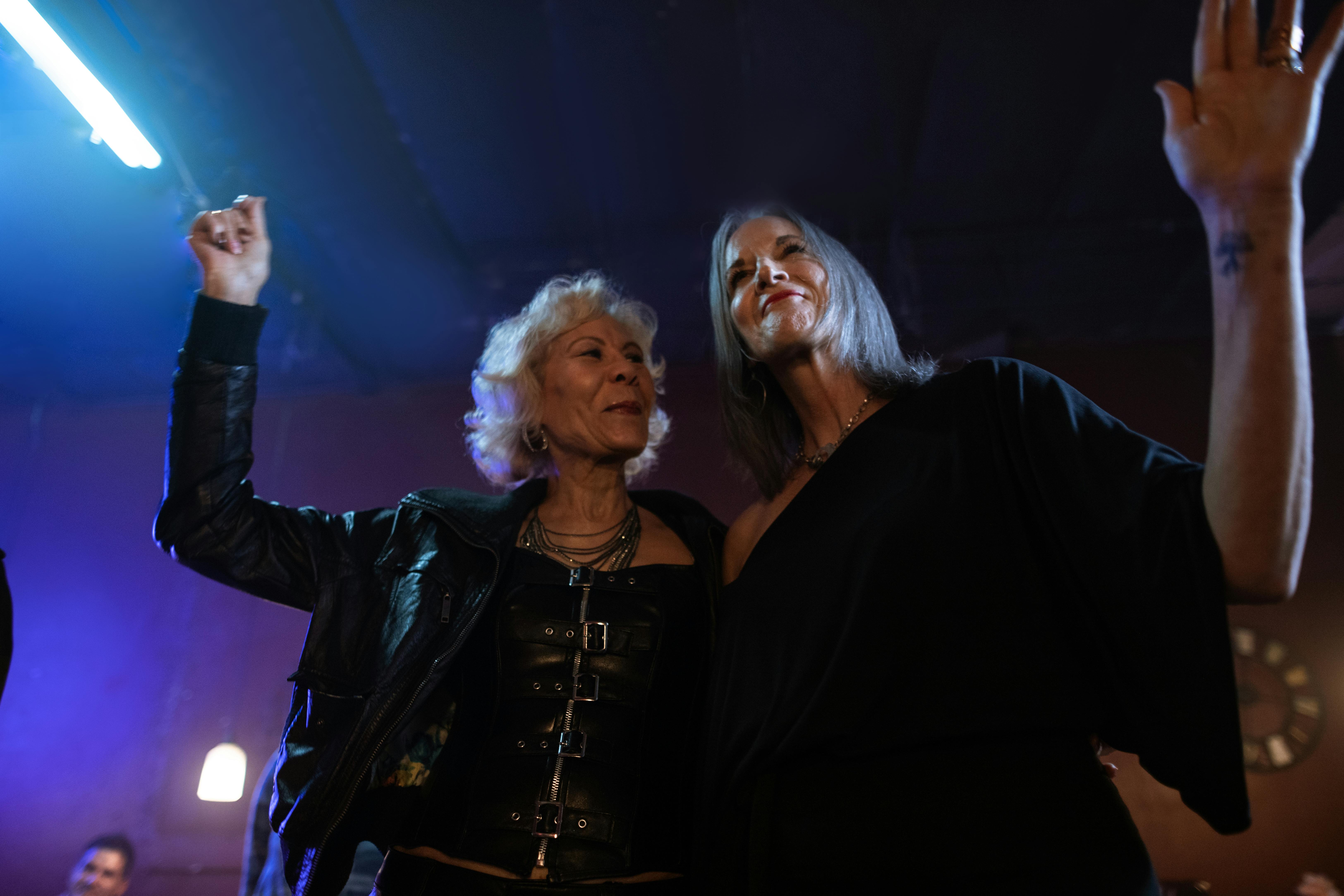 Low-Angle Shot of Elderly Women Having Fun at a Nightclub · Free Stock ...
