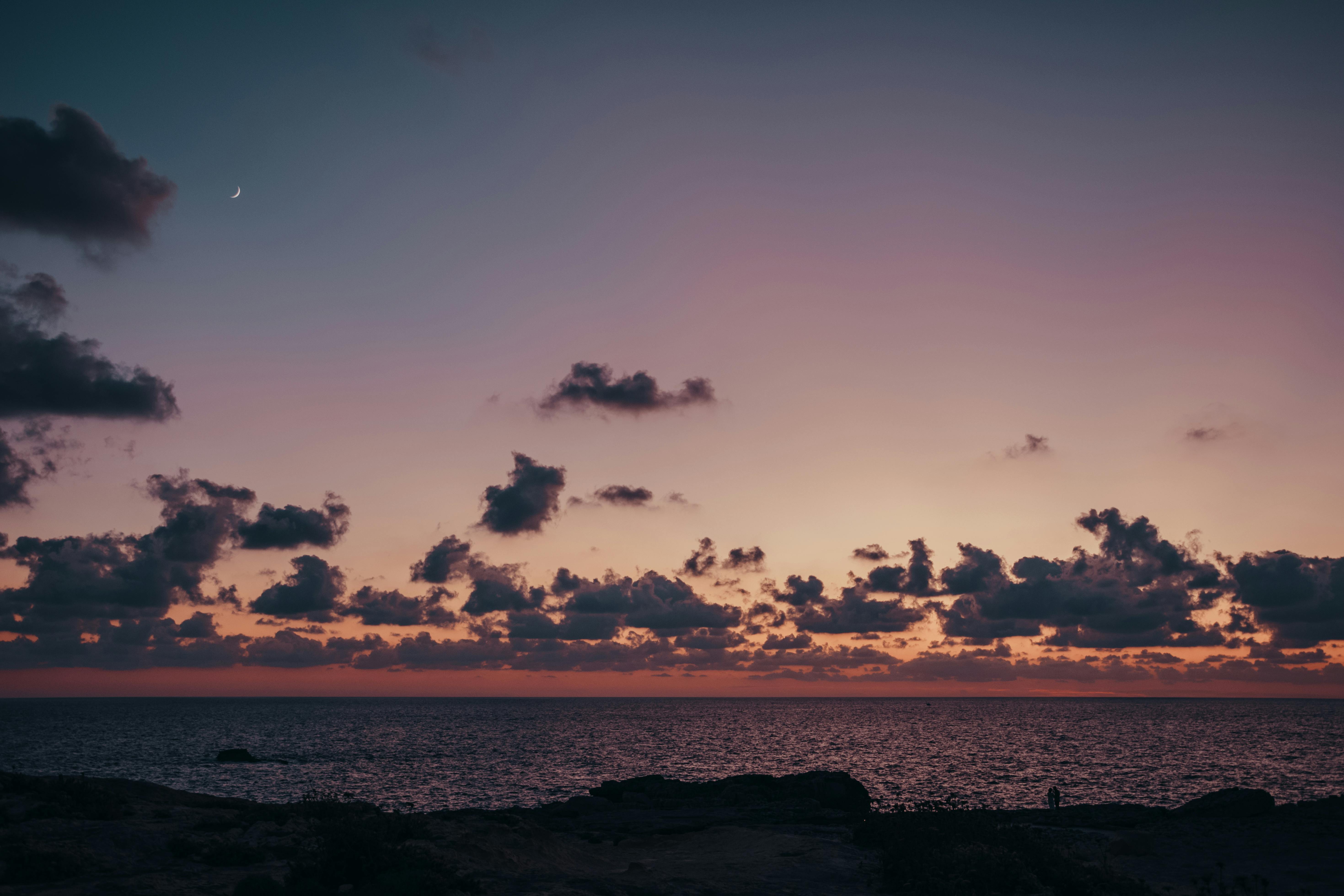 Large Body of Water during Sunset · Free Stock Photo