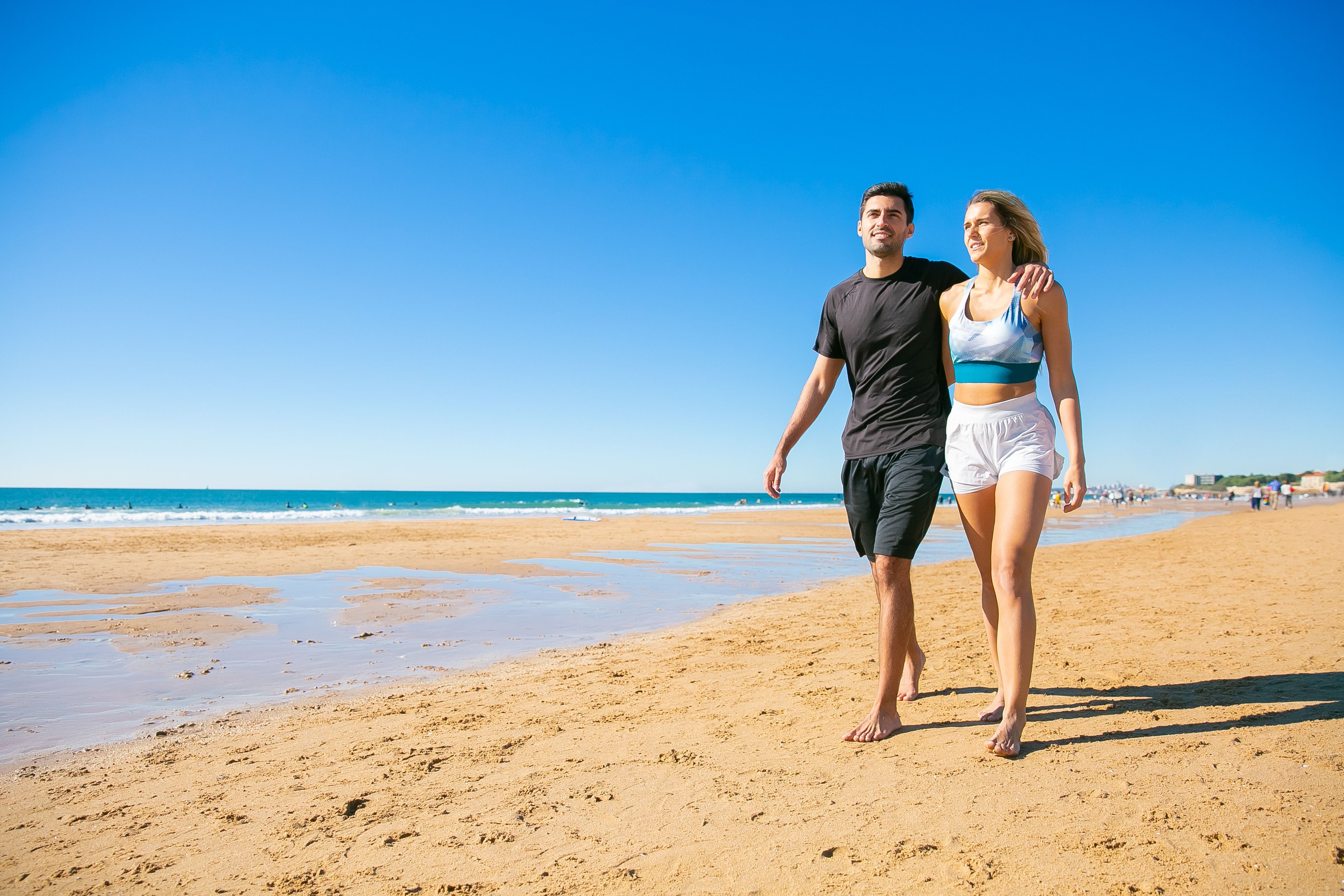 Smiling Couple Holding Hands in Park · Free Stock Photo