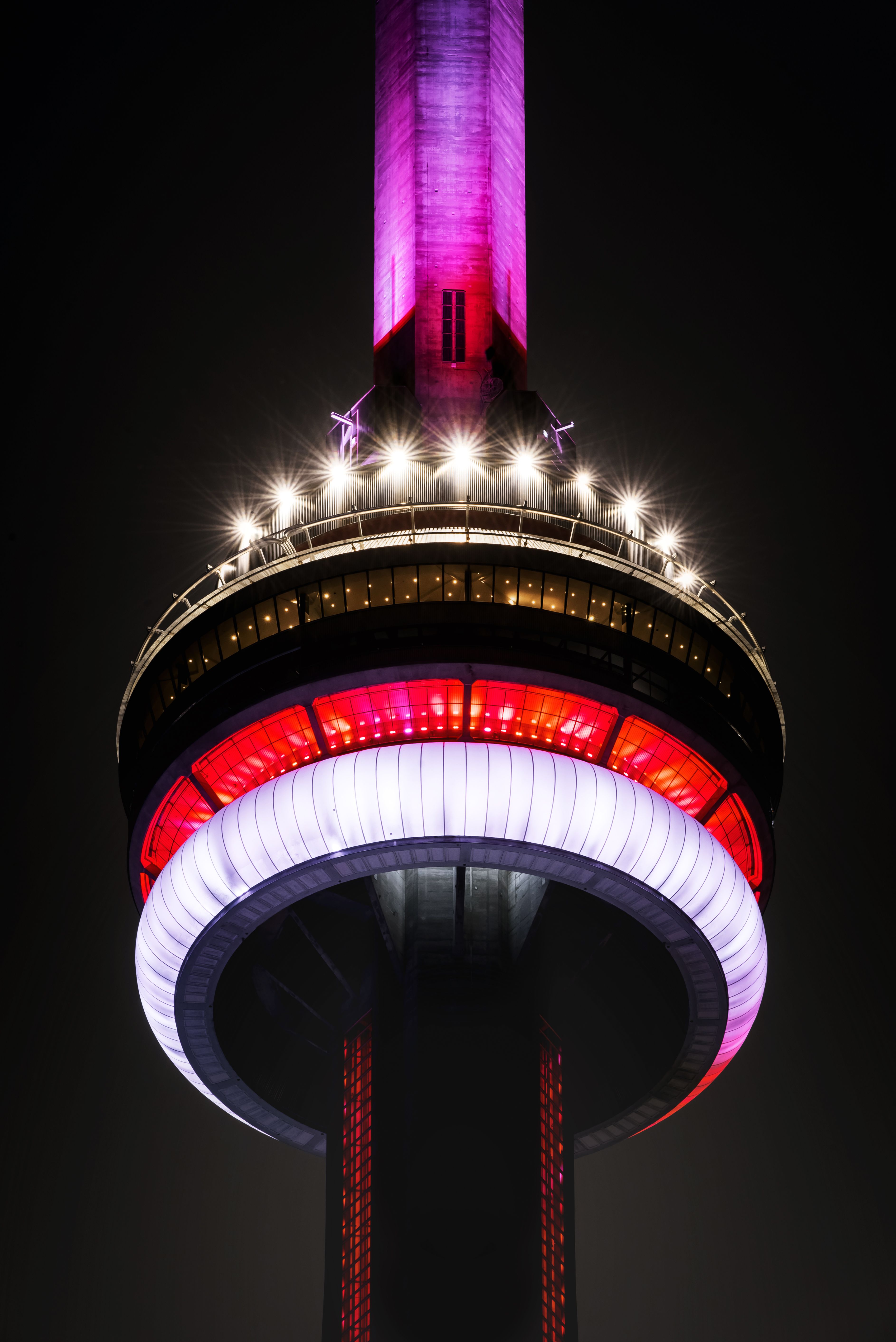 Observation tower glowing in night time · Free Stock Photo