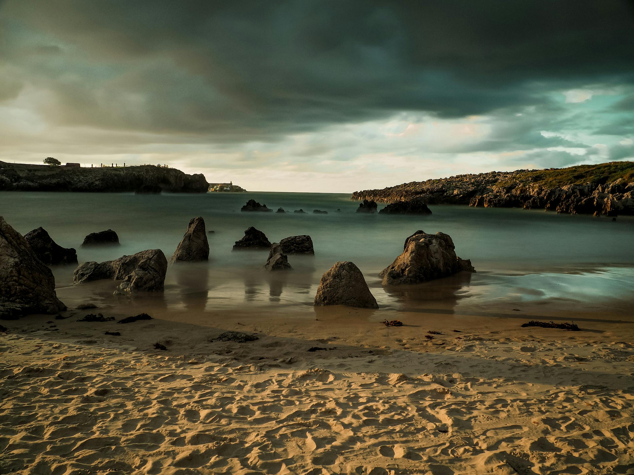 Brown Rock Formation on the Seashore · Free Stock Photo