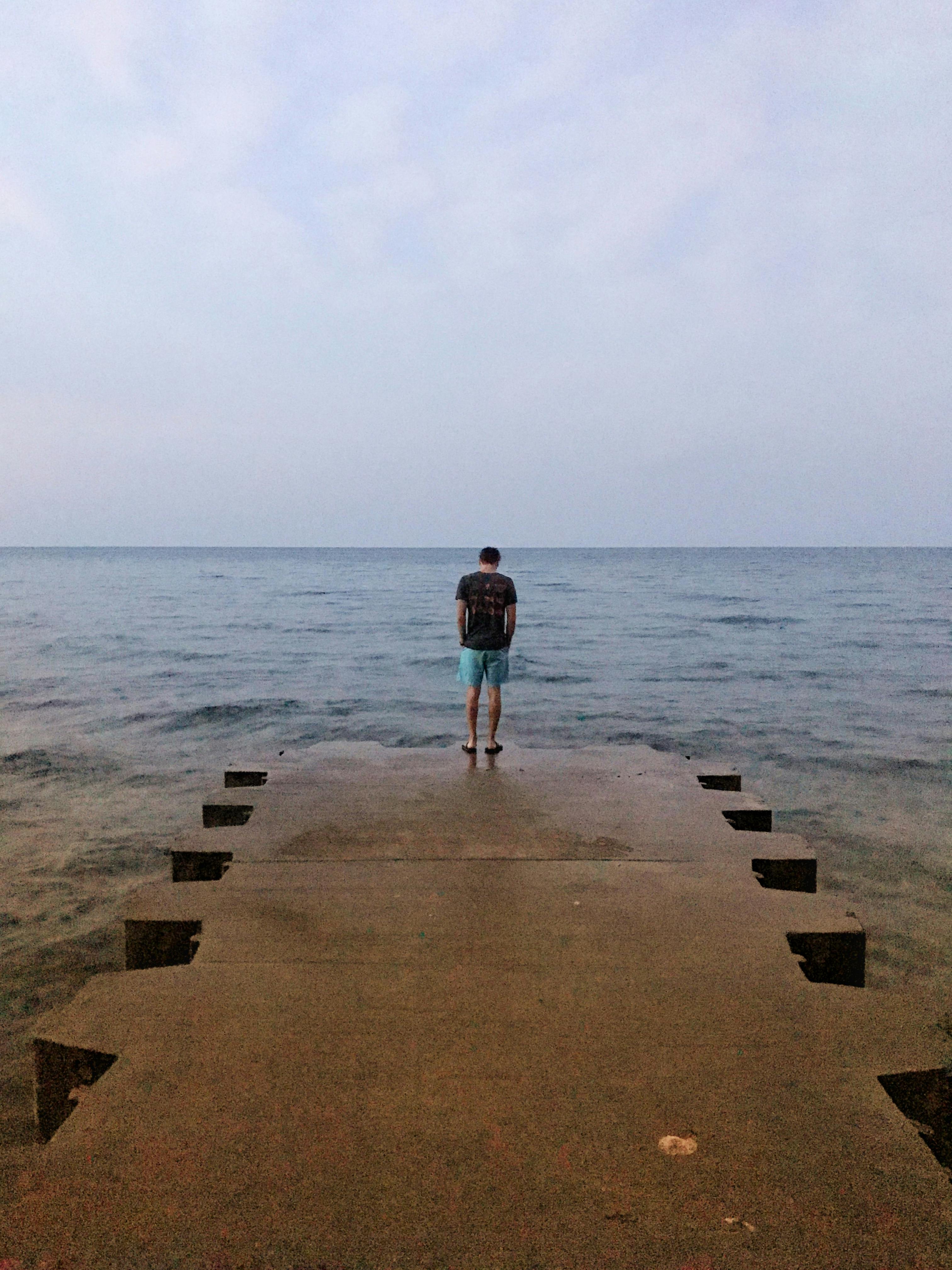 Man Standing On Pier · Free Stock Photo
