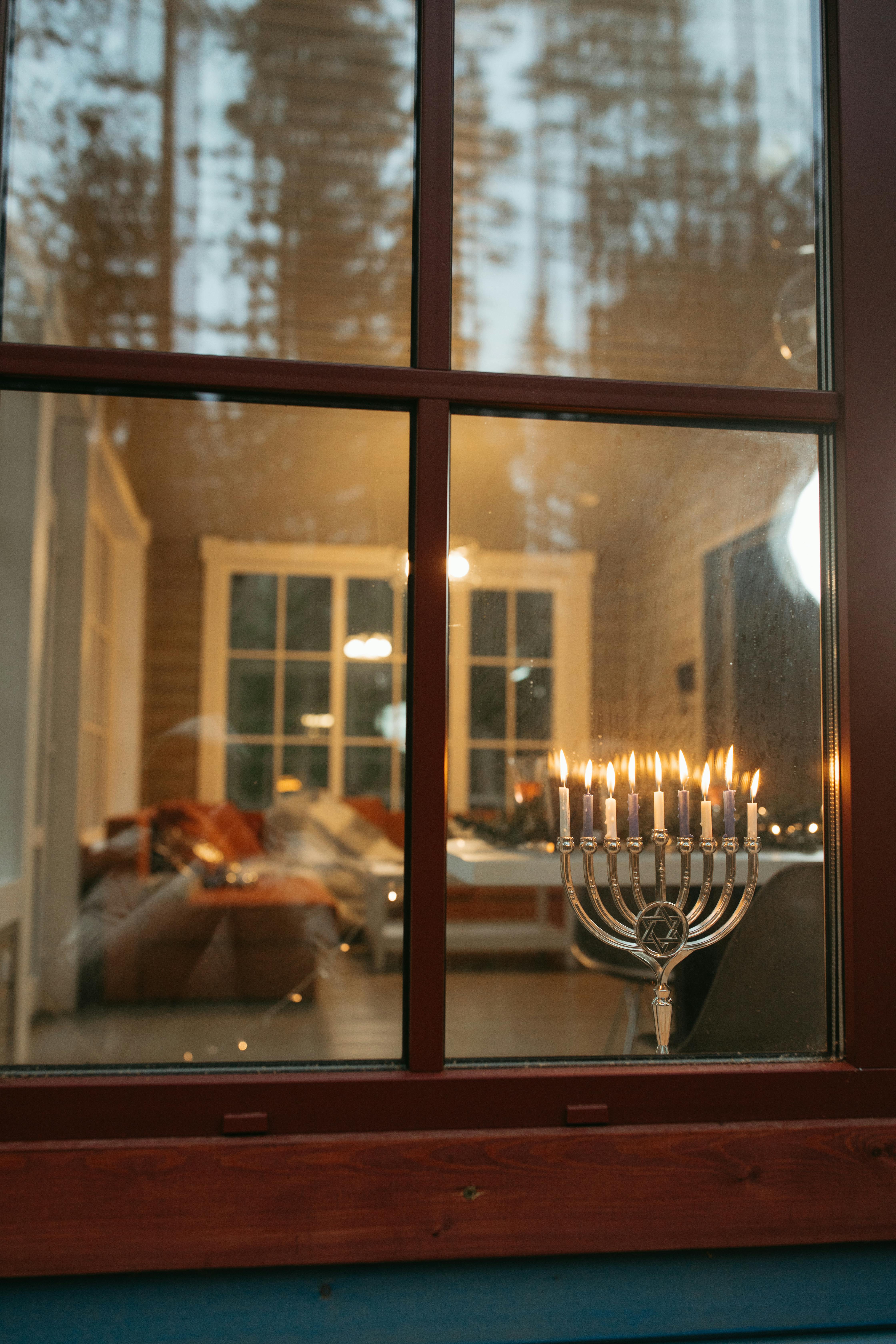 A Lighted Candles by the Window · Free Stock Photo