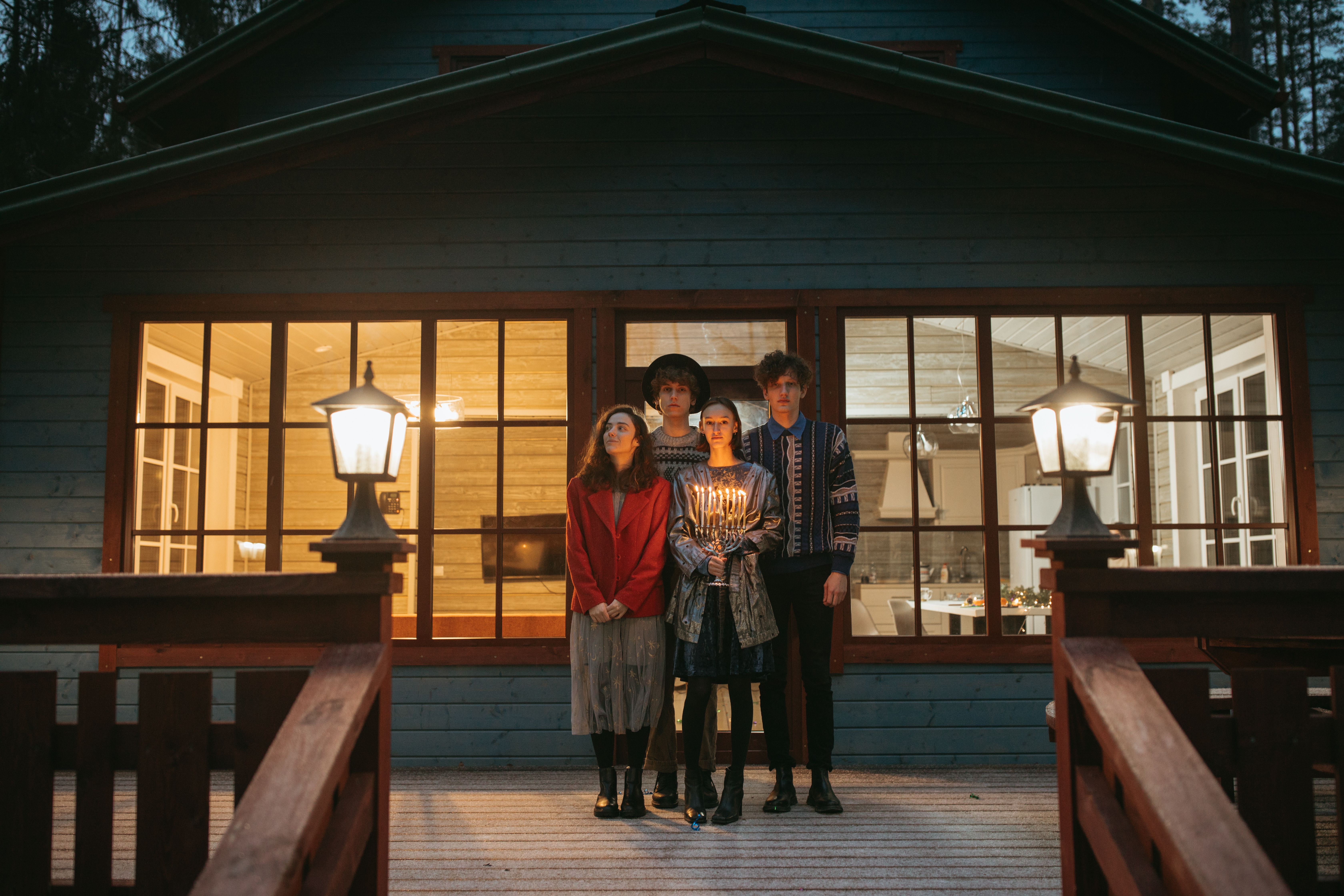 A House At Night With A Porch Light On Photos, Download The BEST Free A ...