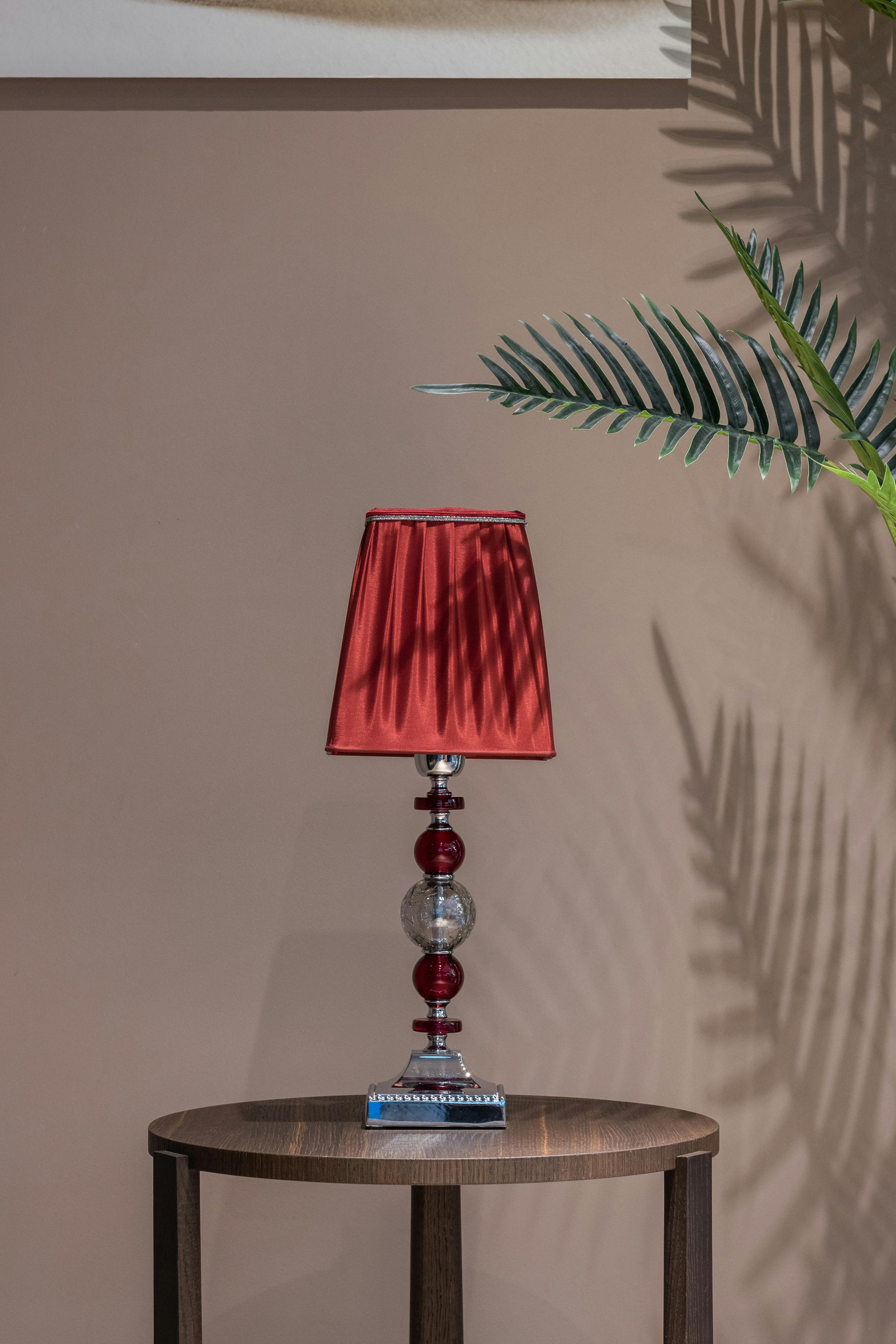 Lamp placed on table in light room · Free Stock Photo