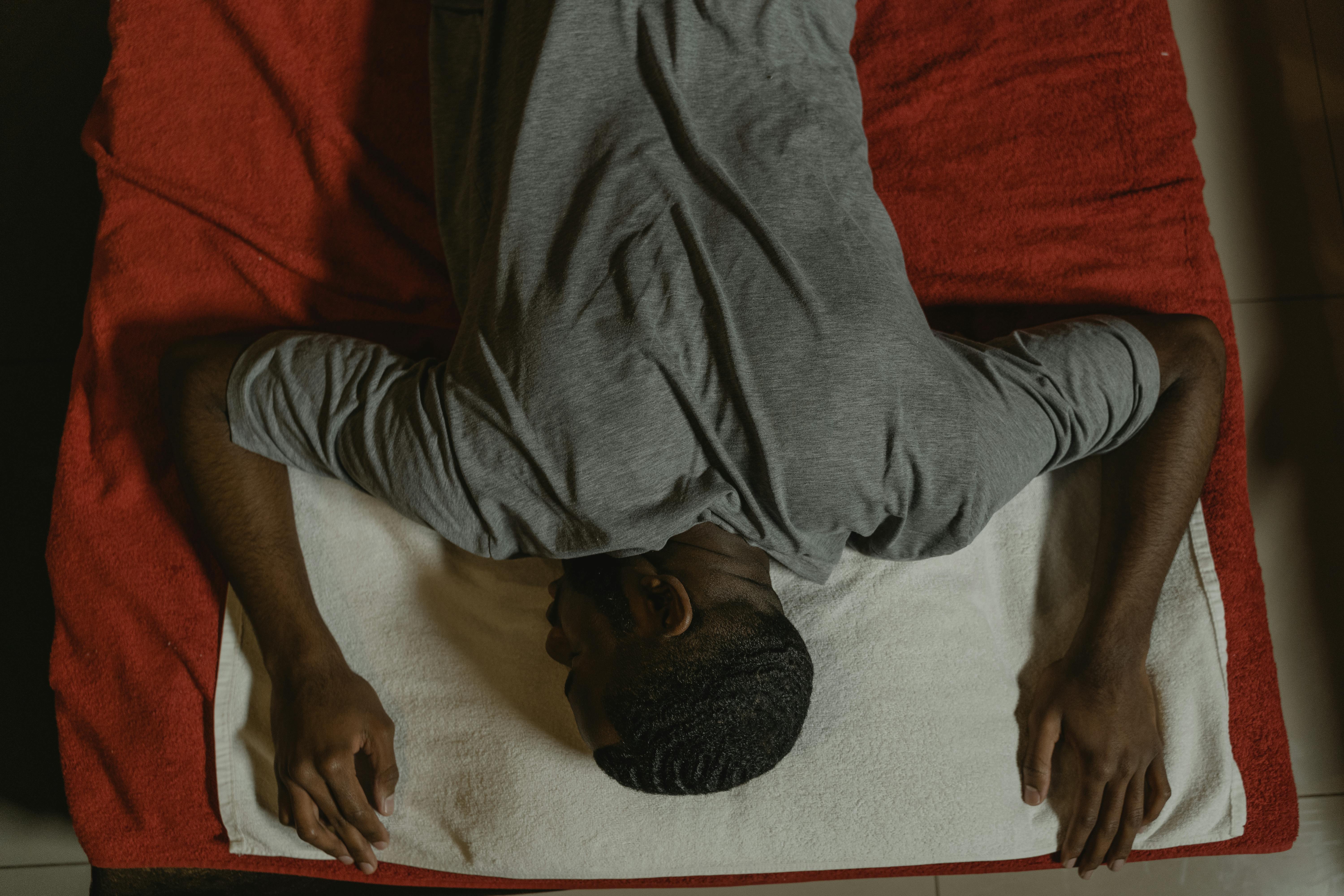 Man Lying on Massage Table · Free Stock Photo