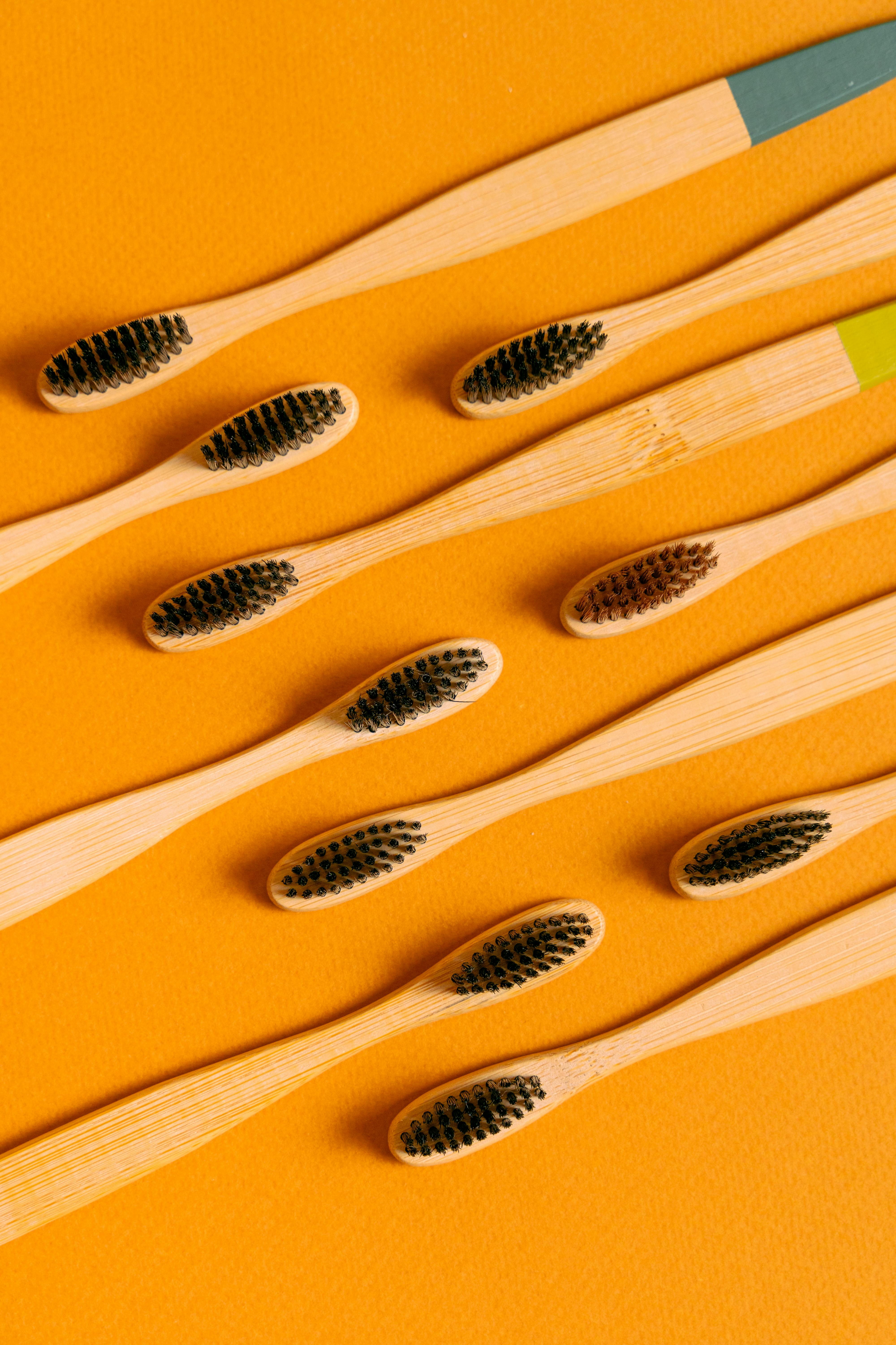 A Close-Up Shot of Wooden Toothbrushes · Free Stock Photo