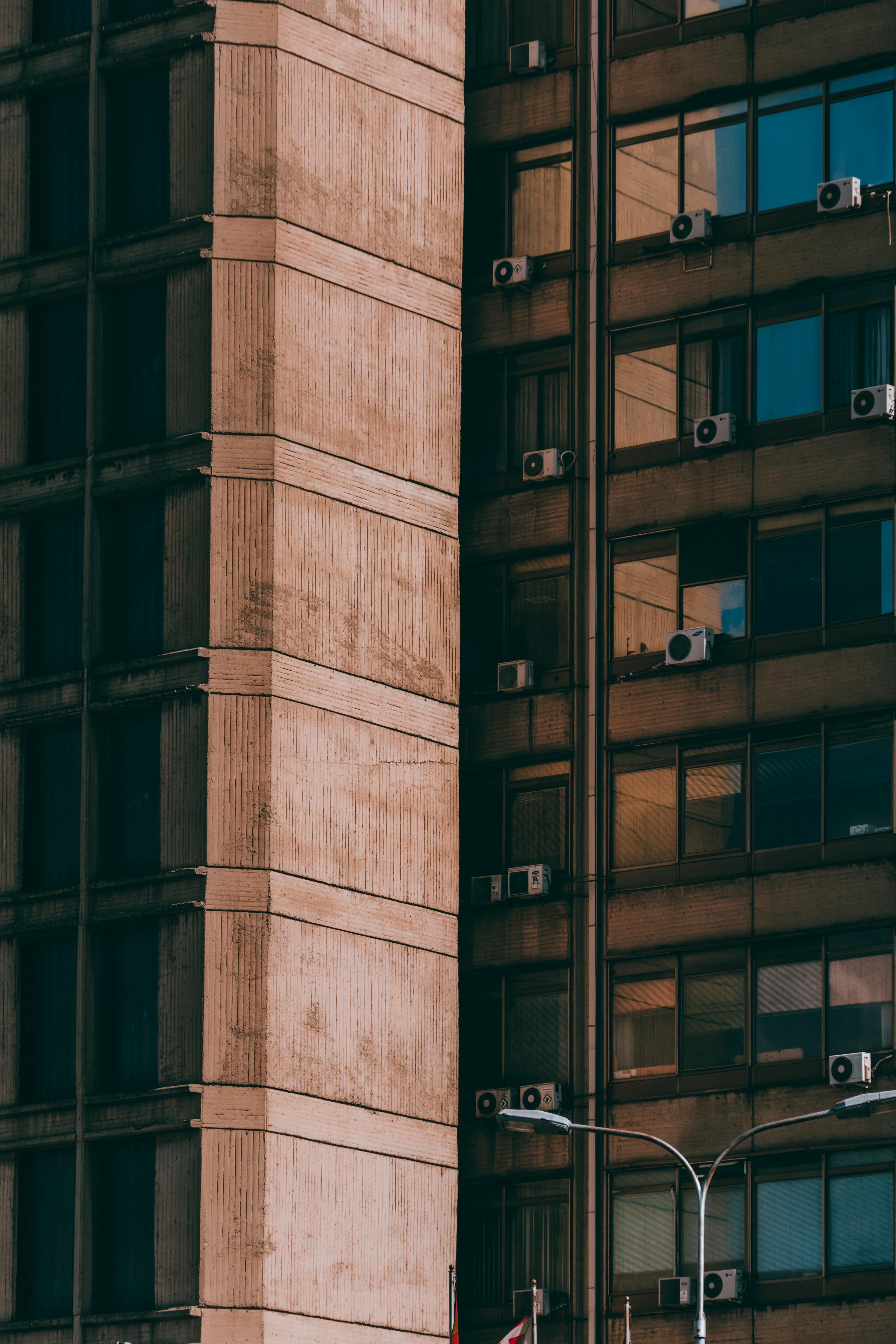 Building with Grated Windows · Free Stock Photo