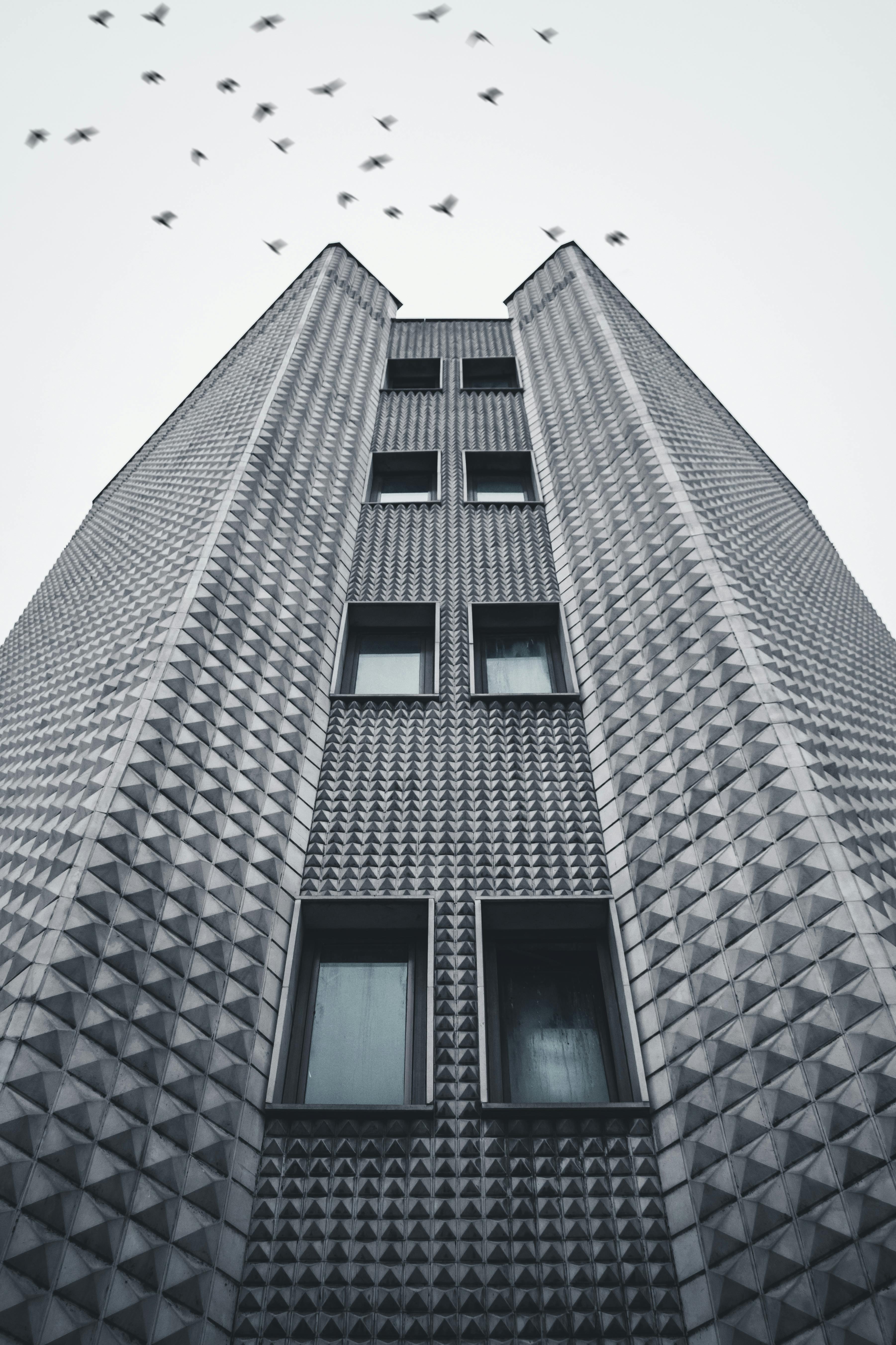 Low-Angle Shot of a Concrete Building · Free Stock Photo