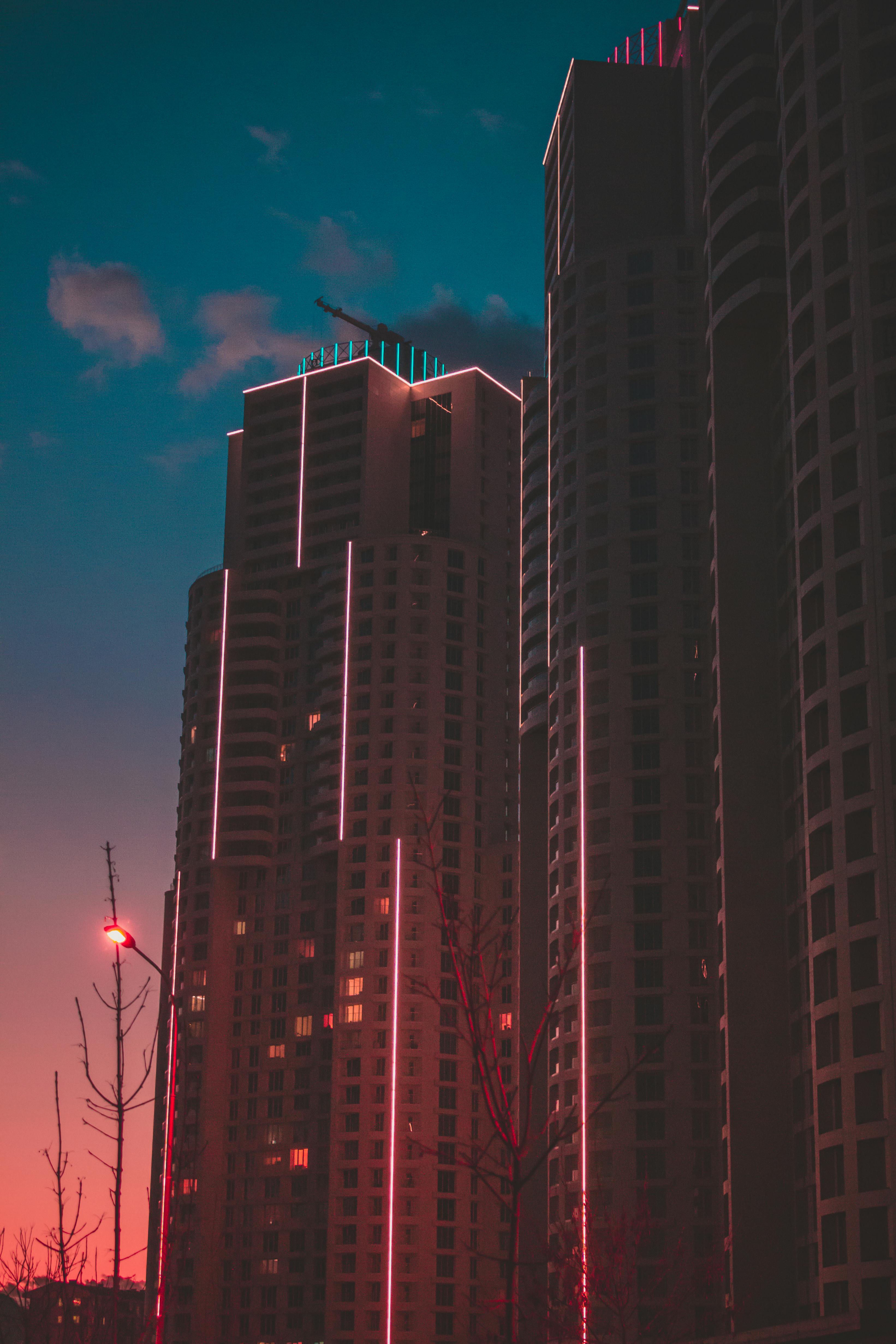 A High-Rise Building during Night Time · Free Stock Photo