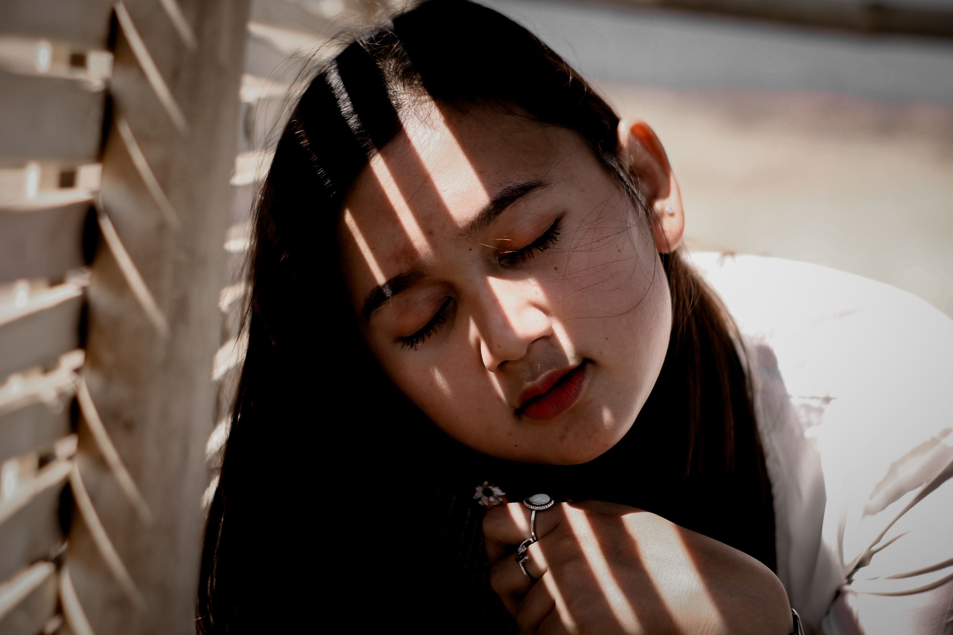 Brunette Woman Hiding Face in Hands · Free Stock Photo
