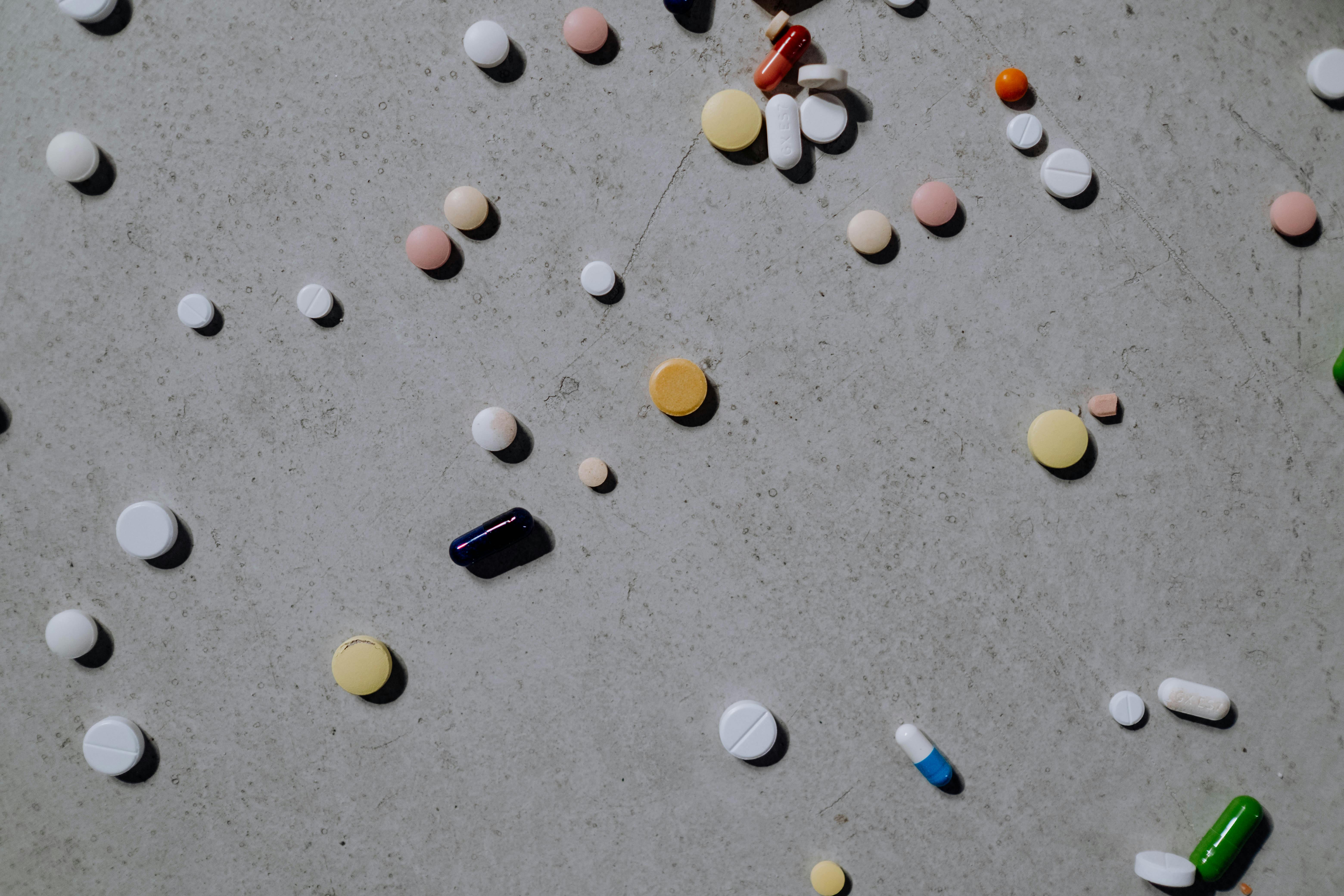 Close-up of Scattered Pills in Different Shapes, Sizes and Colors ...