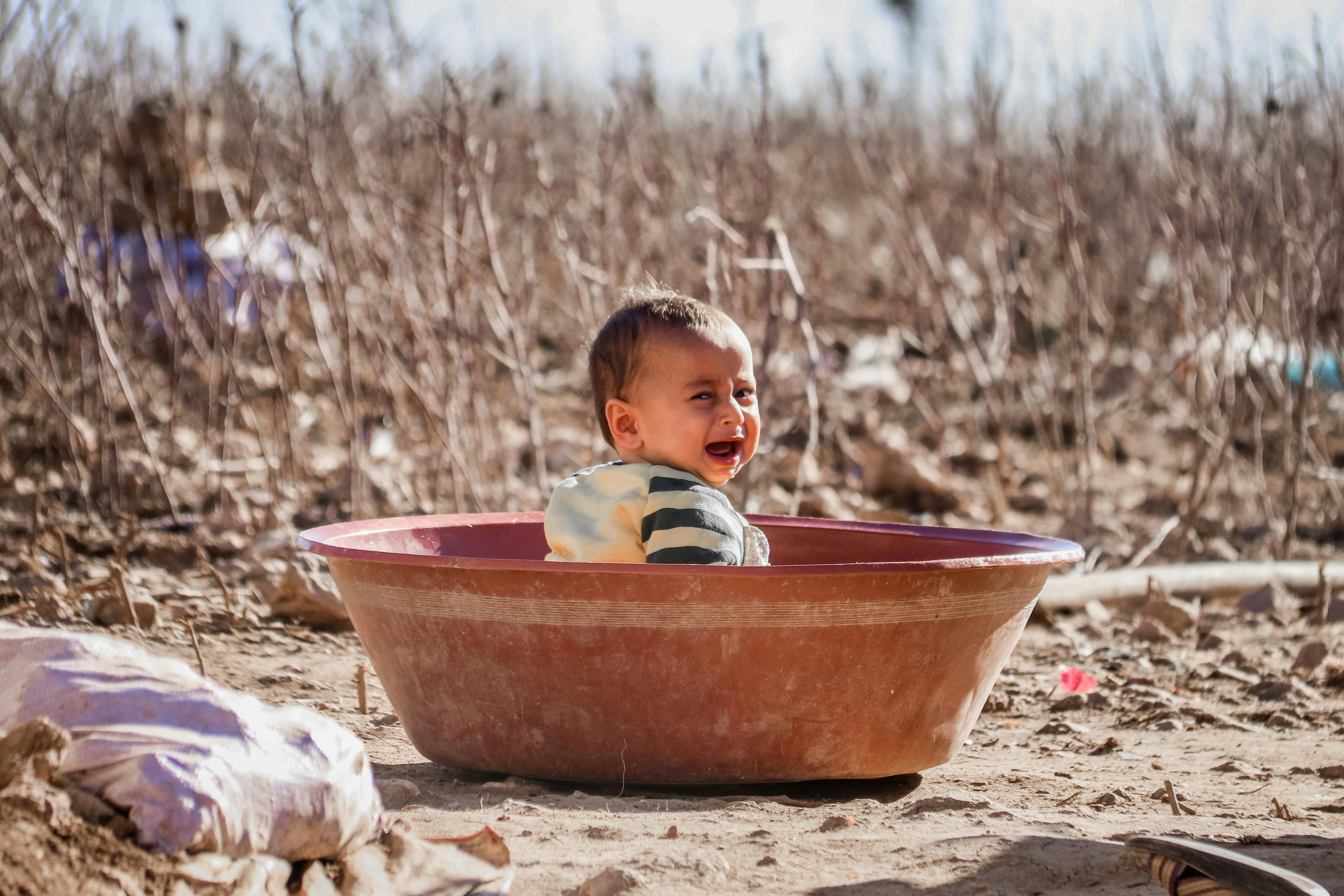Crying Child in the Crowd · Free Stock Photo