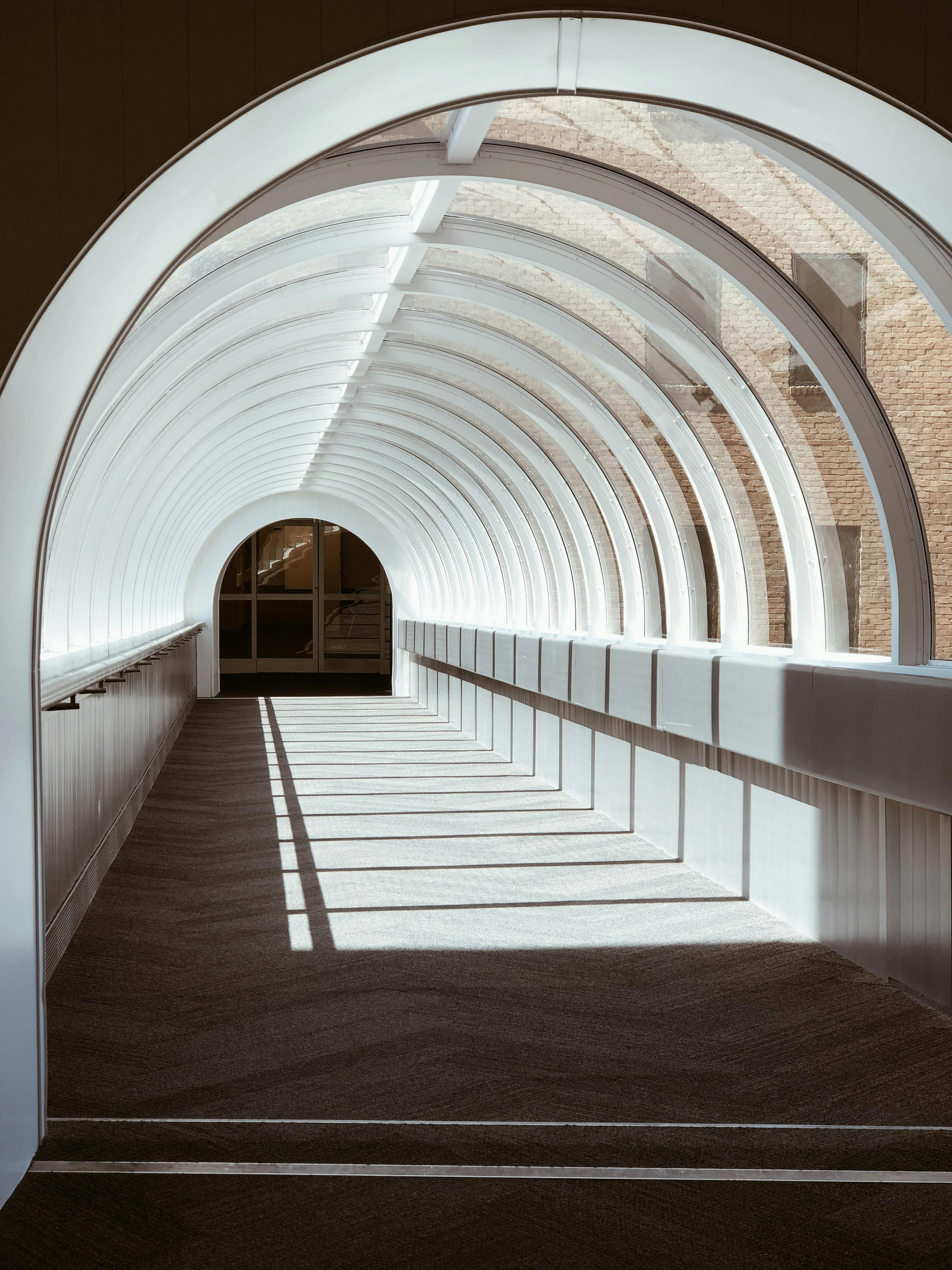Pedestrian Bridge with Glass Arched Roof · Free Stock Photo
