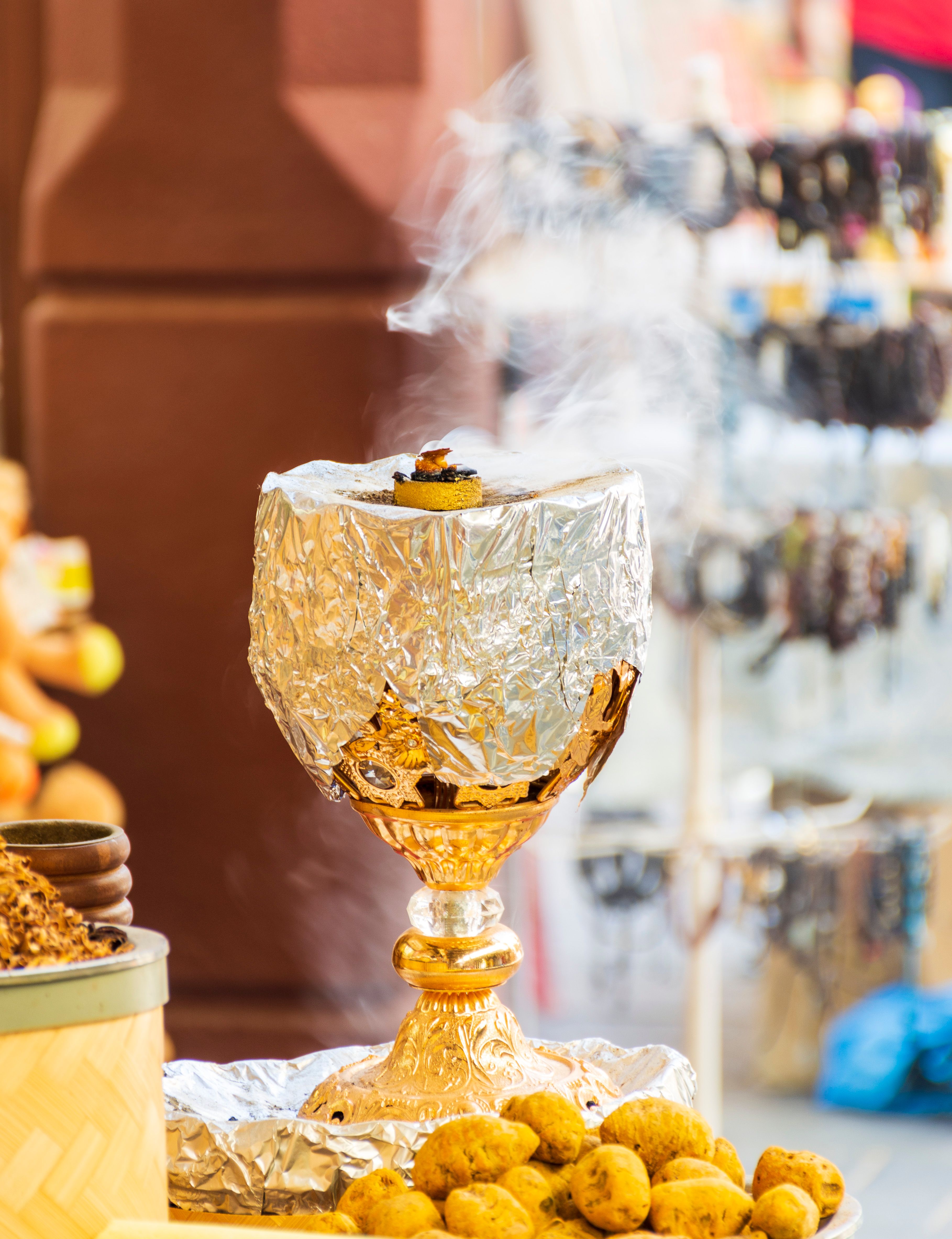 Smoking Candle on Top of a Chalice Covered in Aluminium Foil · Free ...