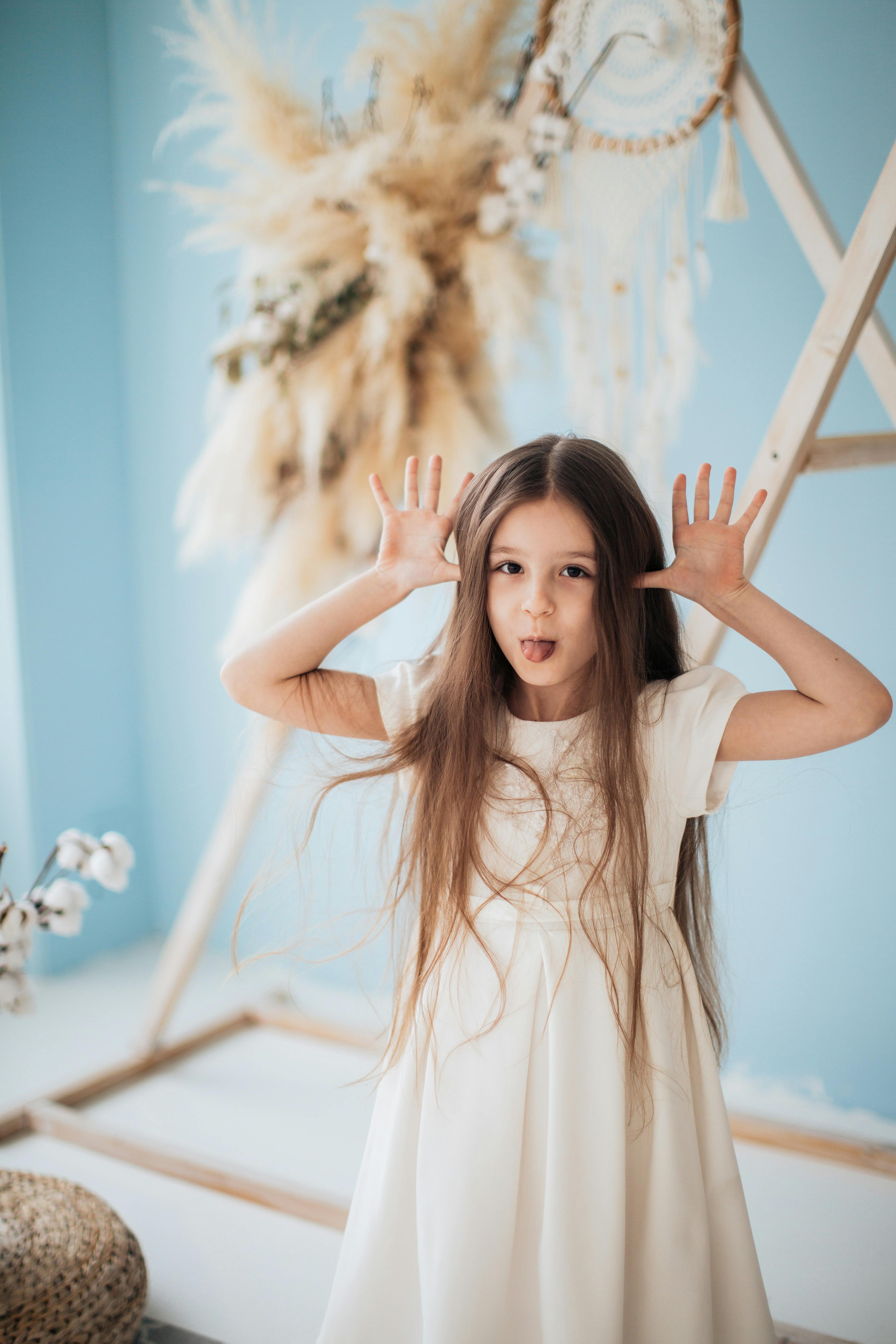 Photo of a Girl Doing a Wacky Pose · Free Stock Photo