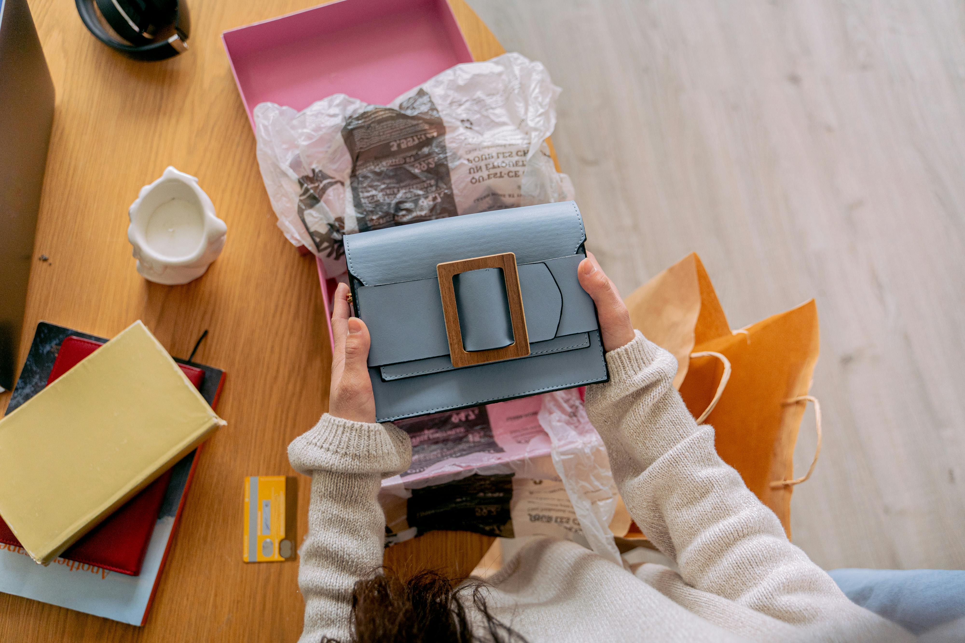 Unboxing Purse from Box · Free Stock Photo