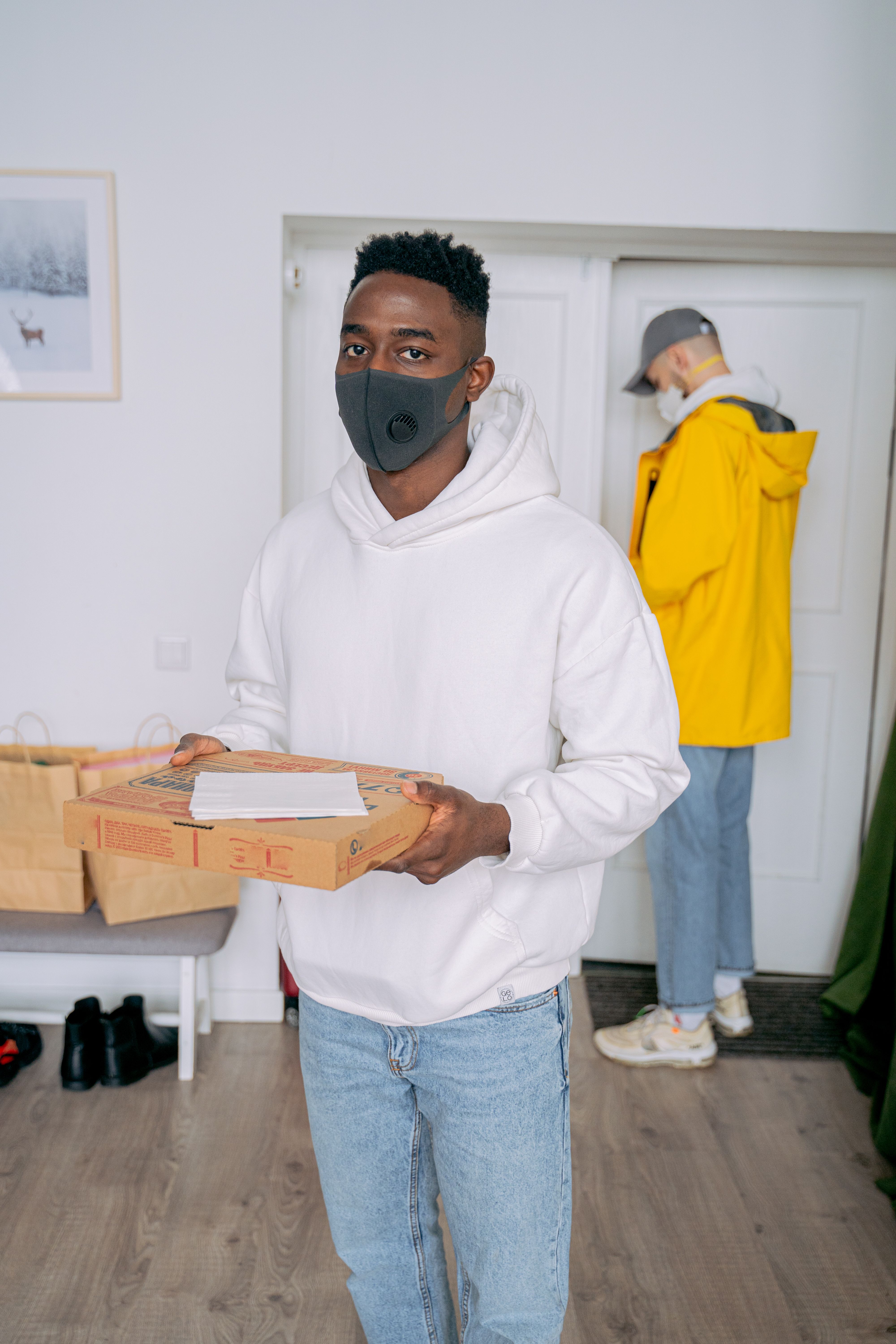 Man Carrying a Plastic Crate · Free Stock Photo